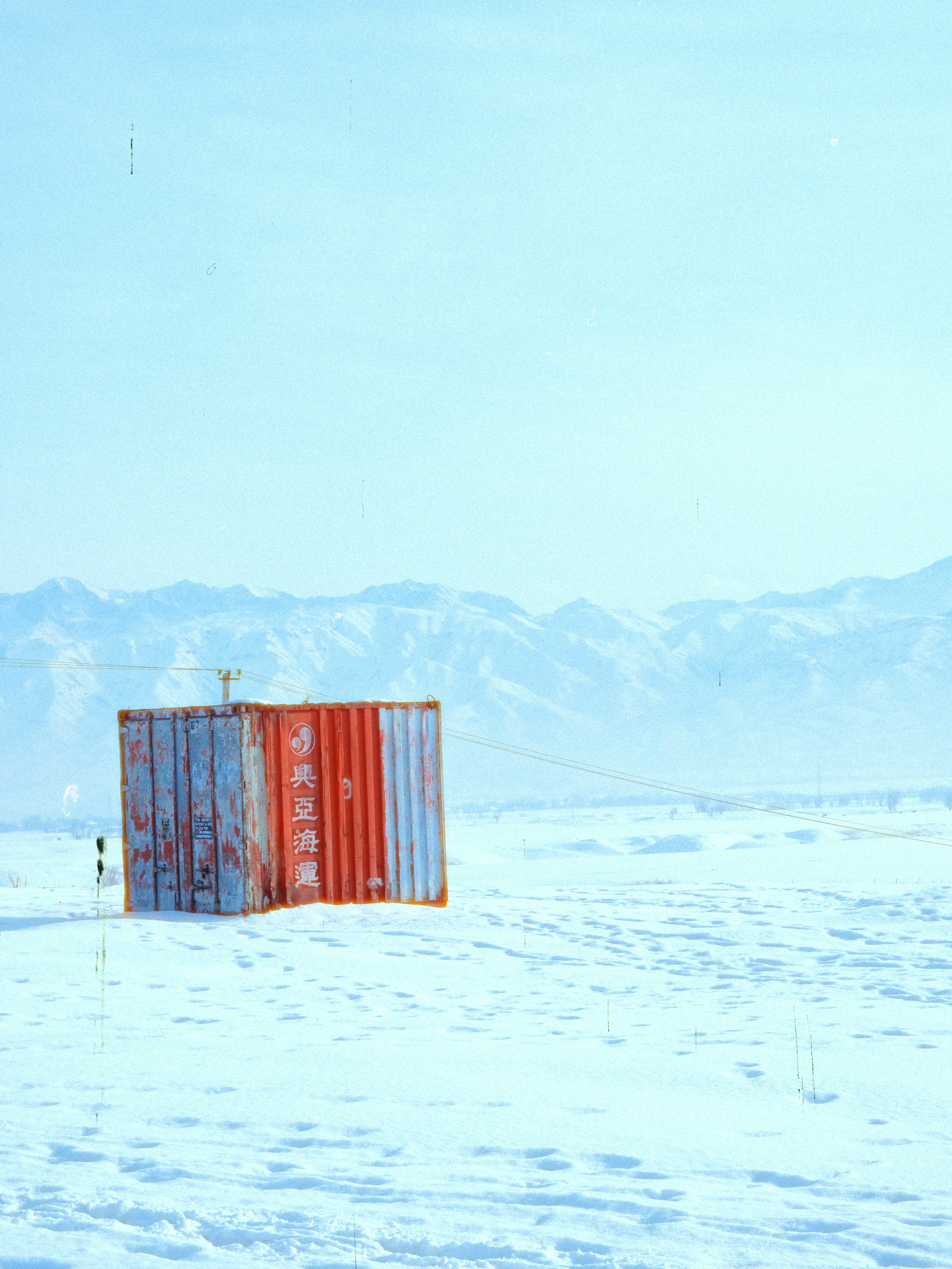 Frozen Shipping Box on a Frosted Plain