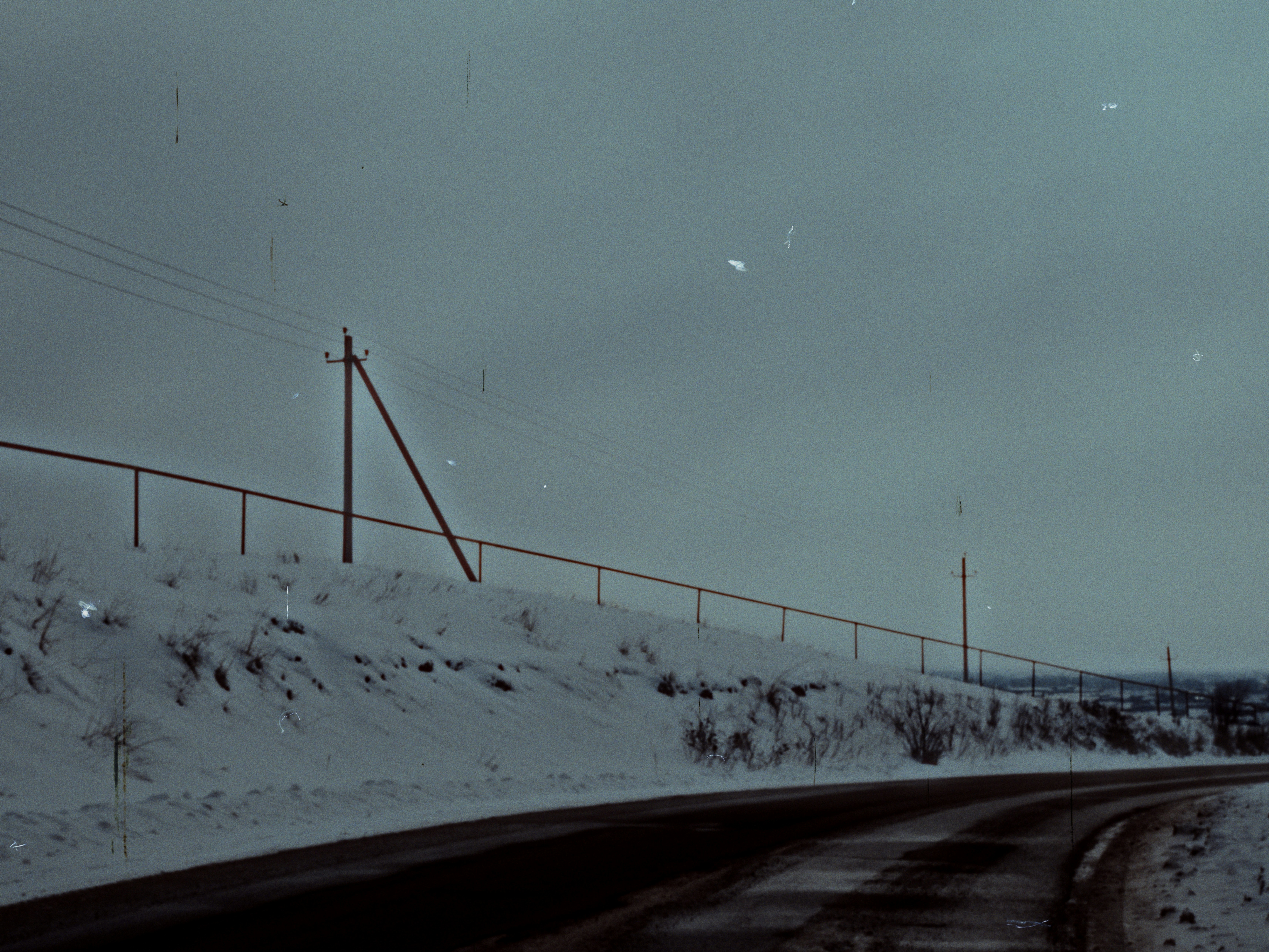 Snowbound Curve: The Quiet Highway Curves into Winter Silence