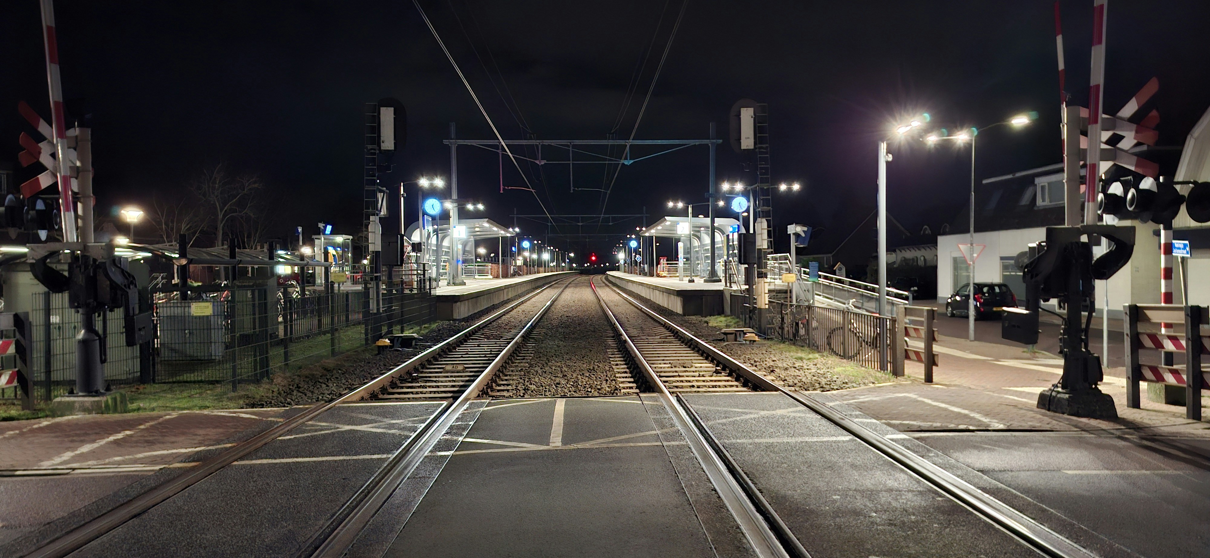 Night Rails: Converging Tracks Toward the City’s Quiet Horizon