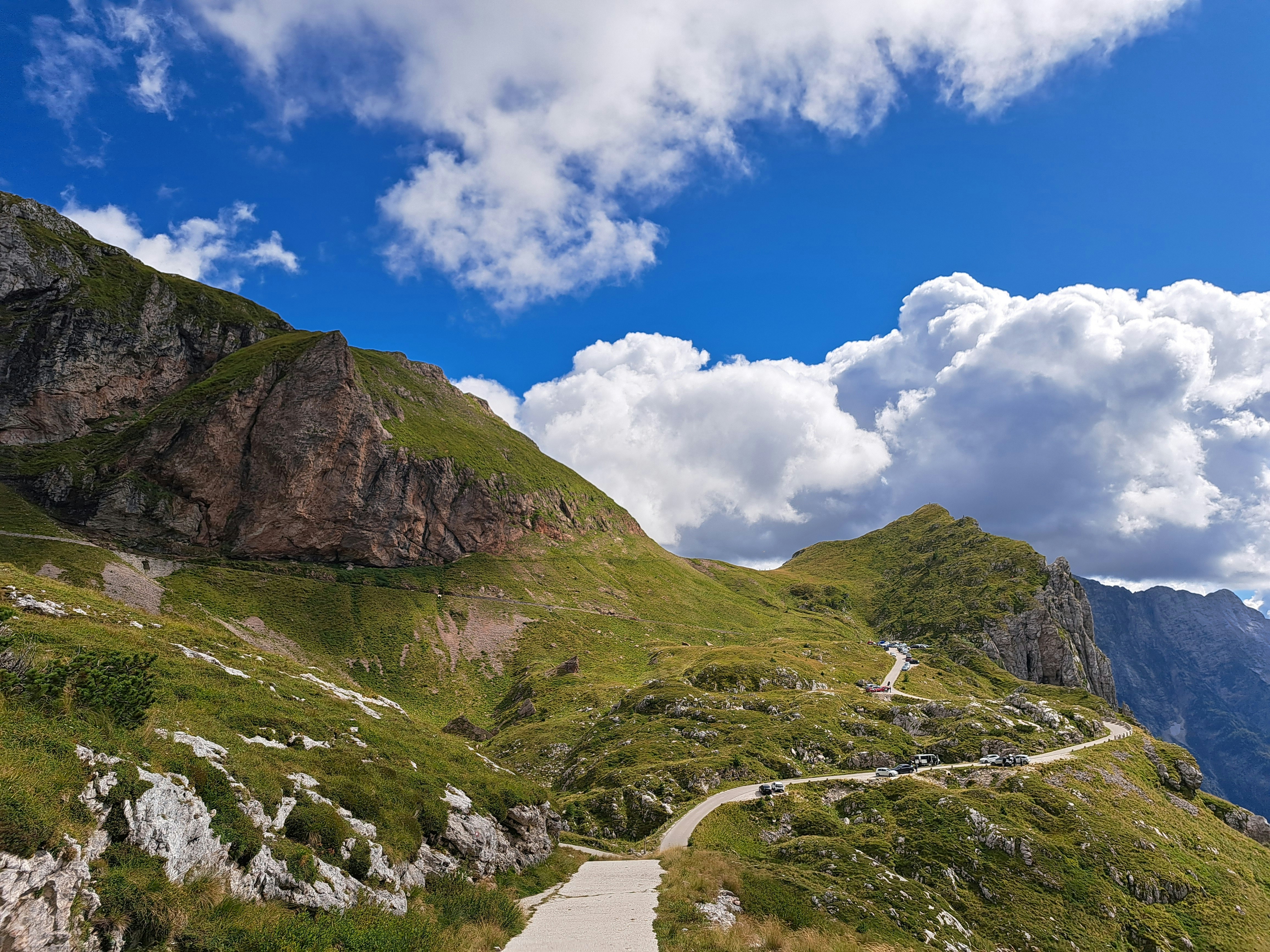 Ridge Route Through Alpine Terrain Under a Veil of Clouds