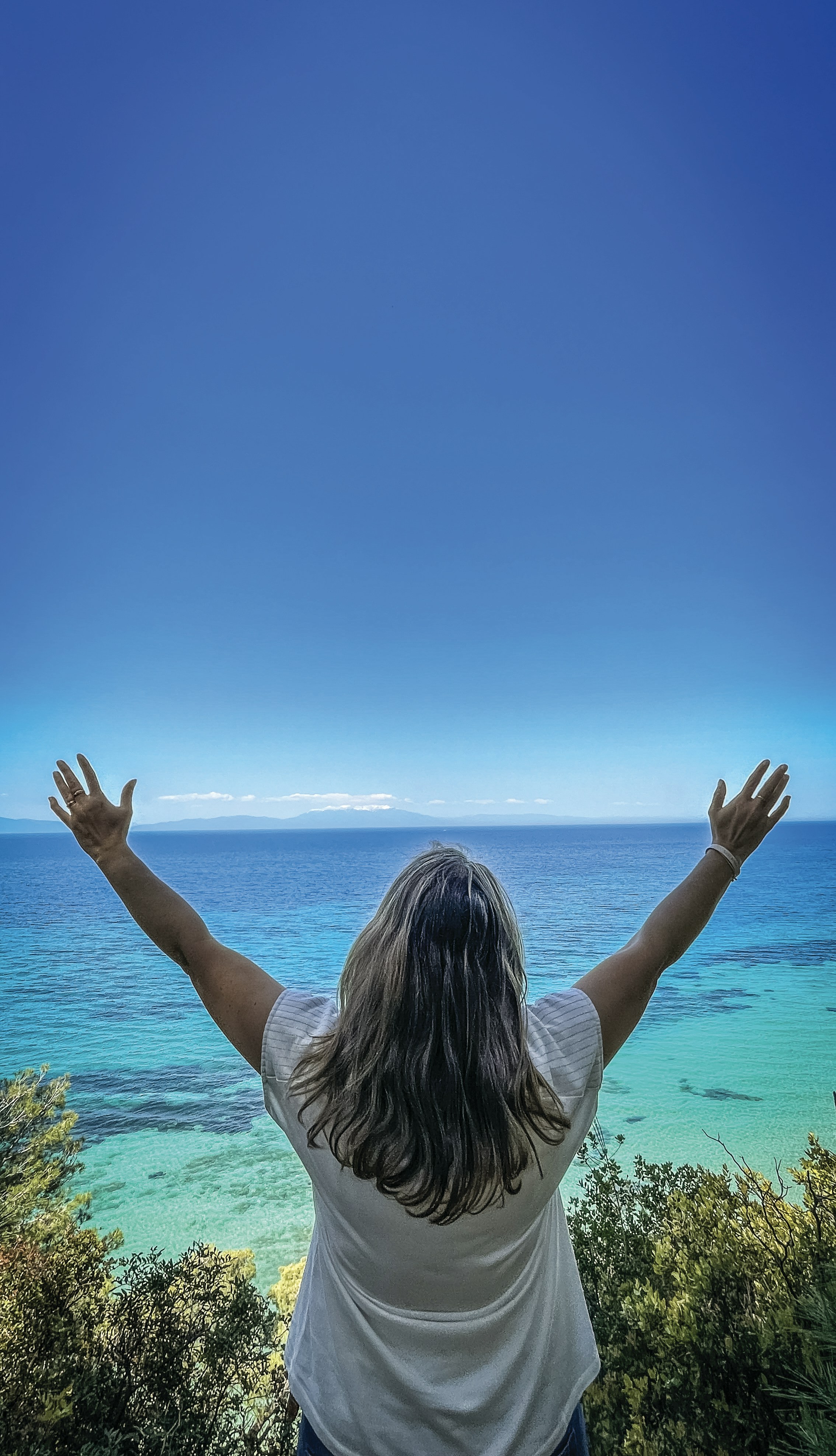 Open Arms by the Sea: A Cape-View Moment
