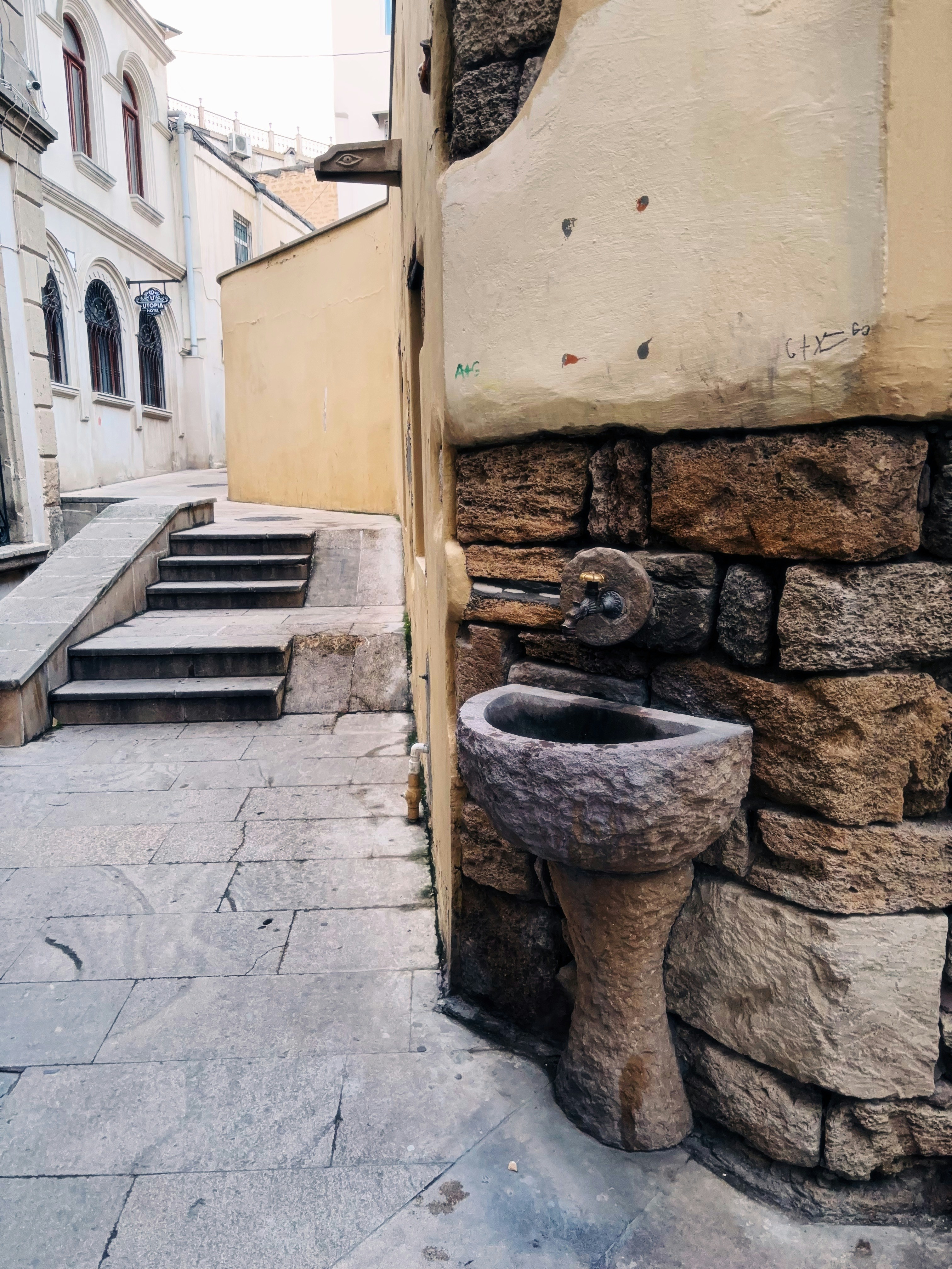 Stone Fountain on a Quiet Alley: A Texture Portrait of Old Town