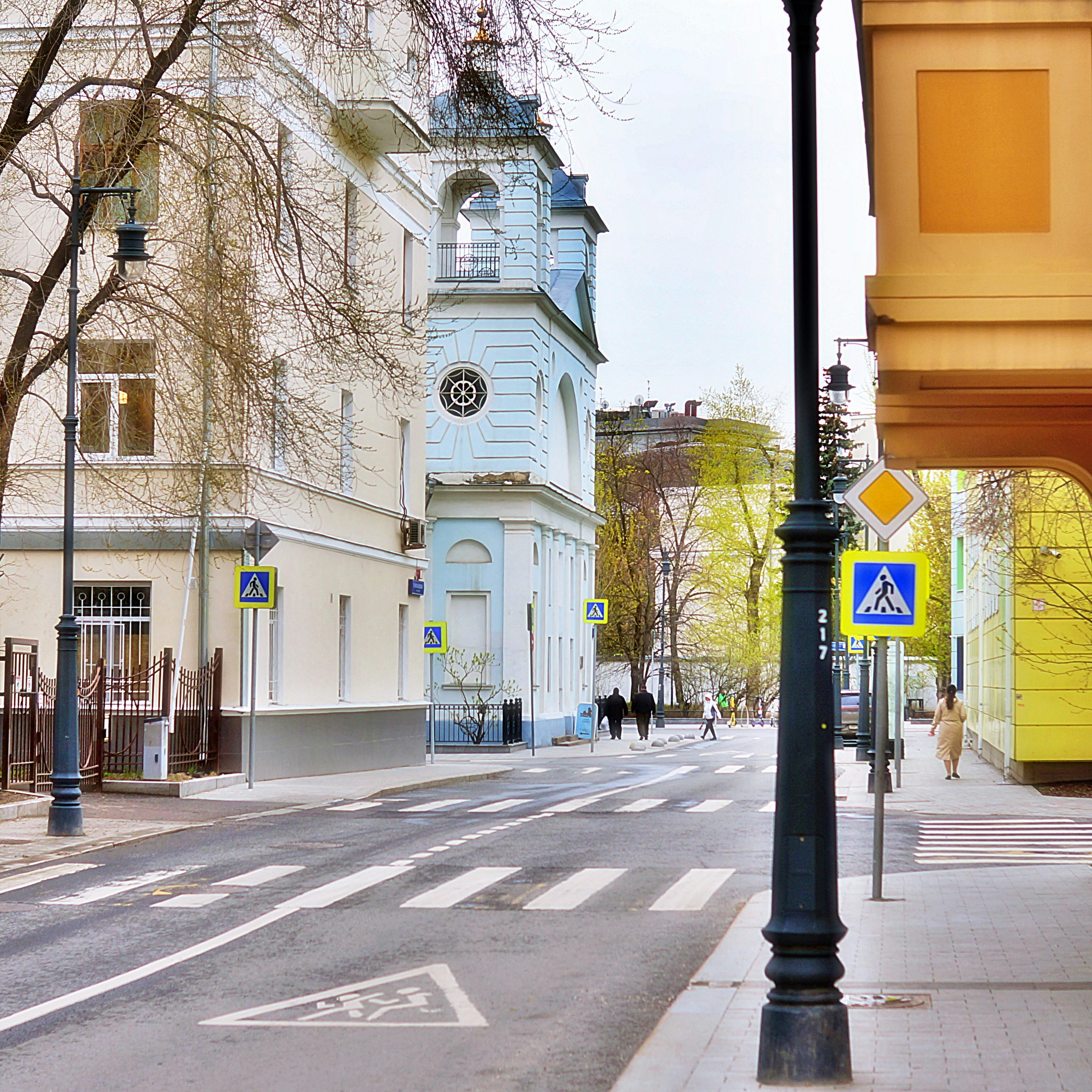 Pastel Streetscape: A Quiet Corner of a European Avenue