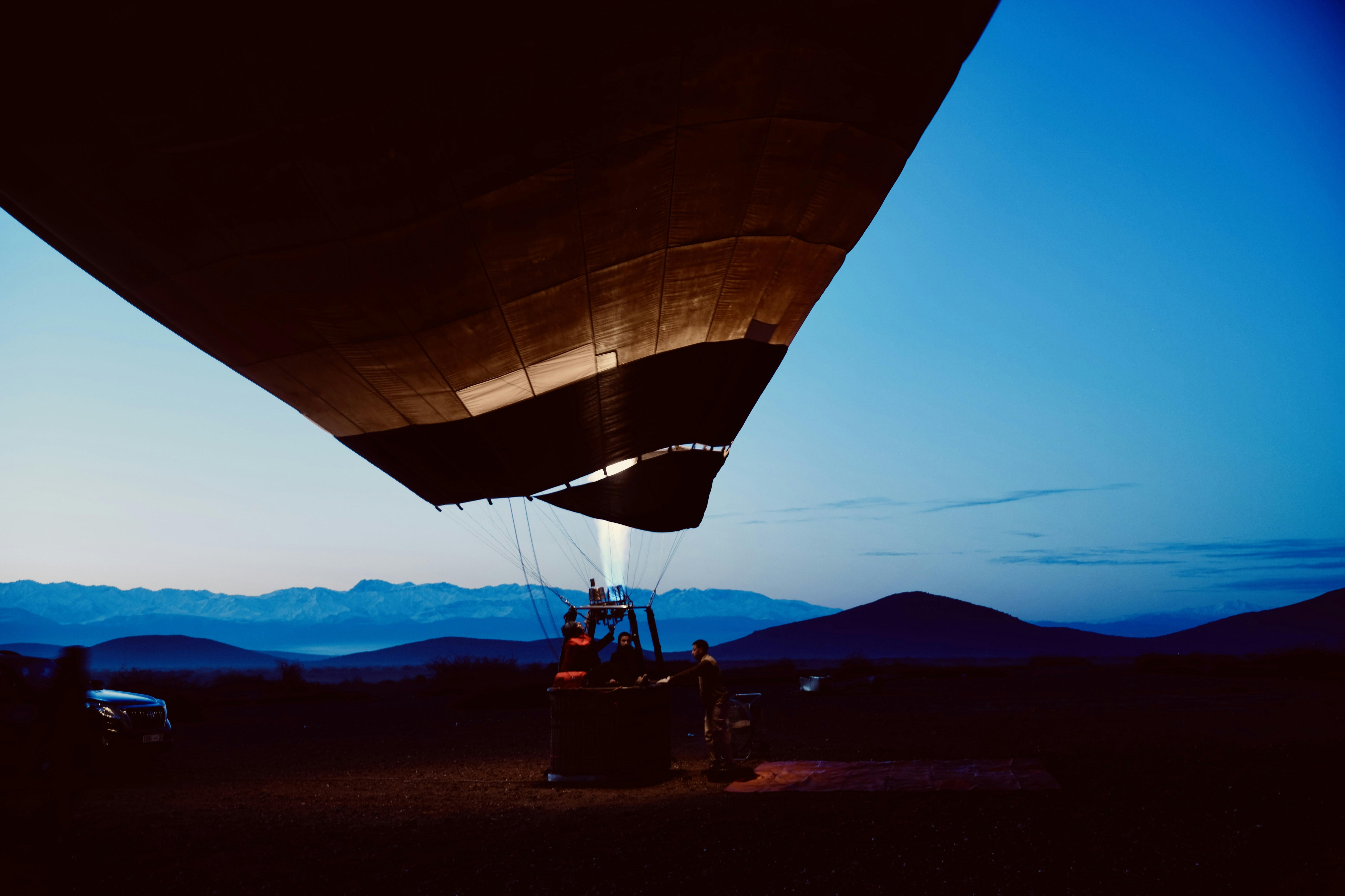 A Lone Balloon Lift-off Under a Vast Dusk Sky