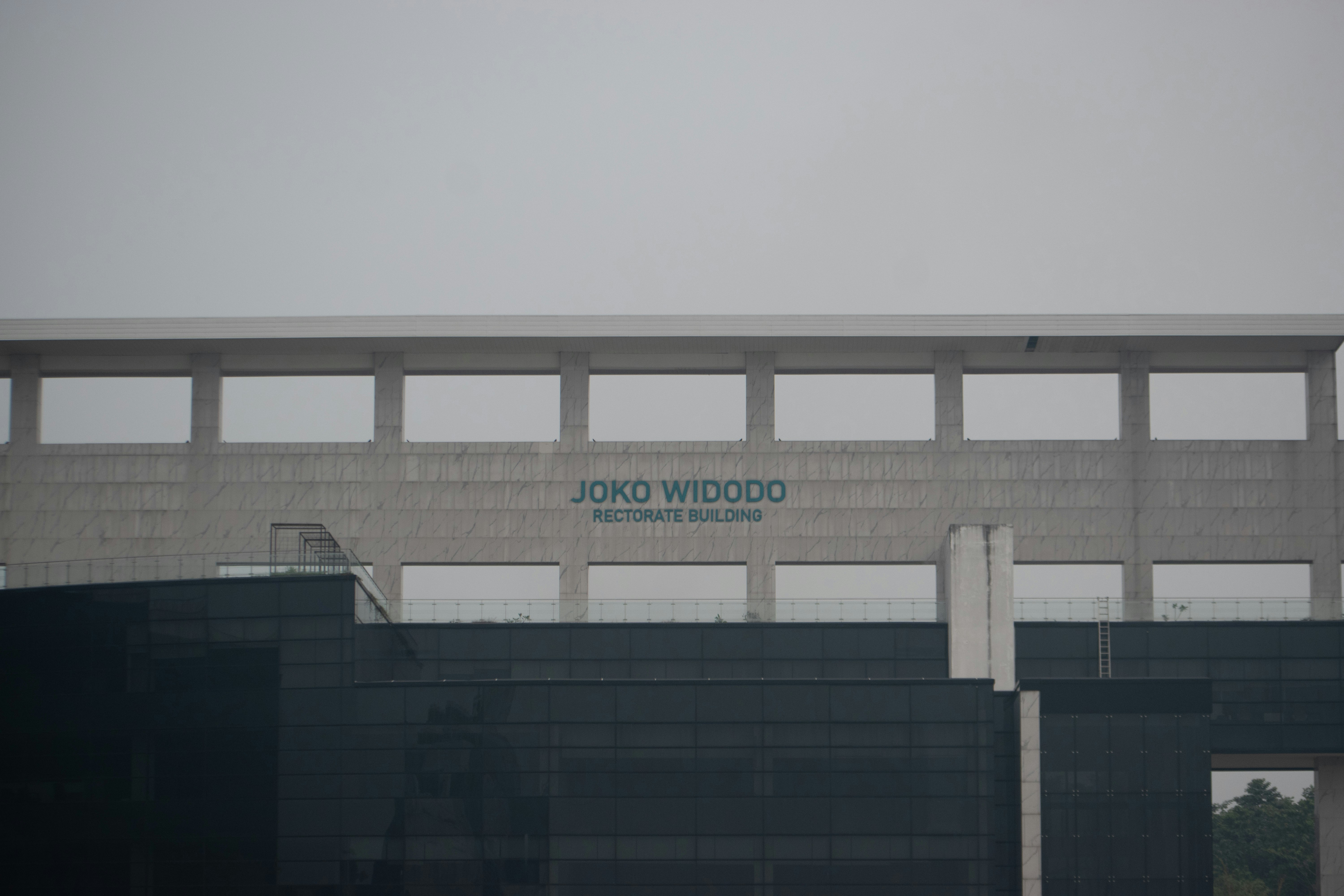Joko Widodo Rectorate Facade: A Minimalist City Silhouette