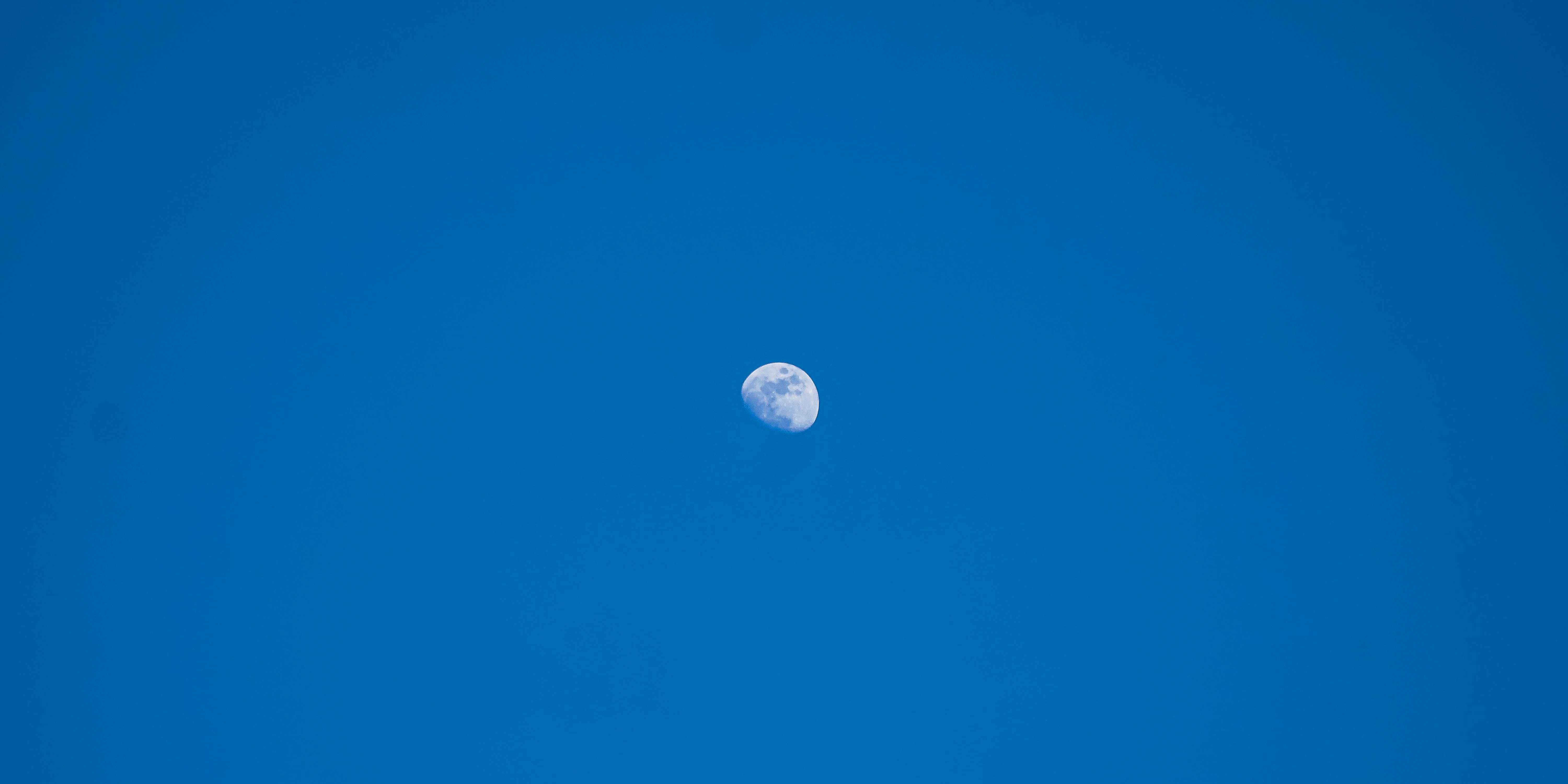 Lone Moon in Cerulean Sky