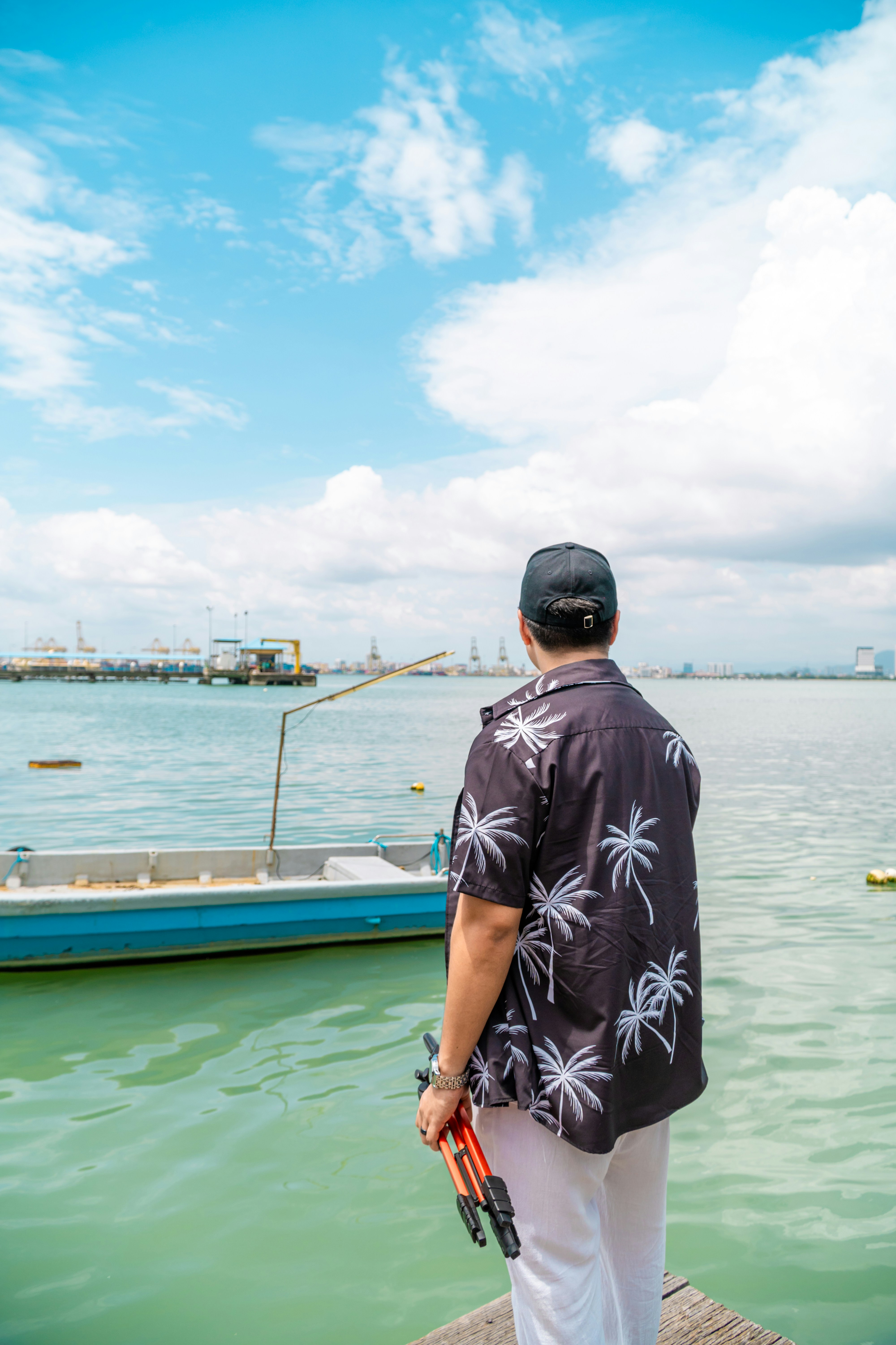Harbor Breeze: A Casual Portrait Near the Dock