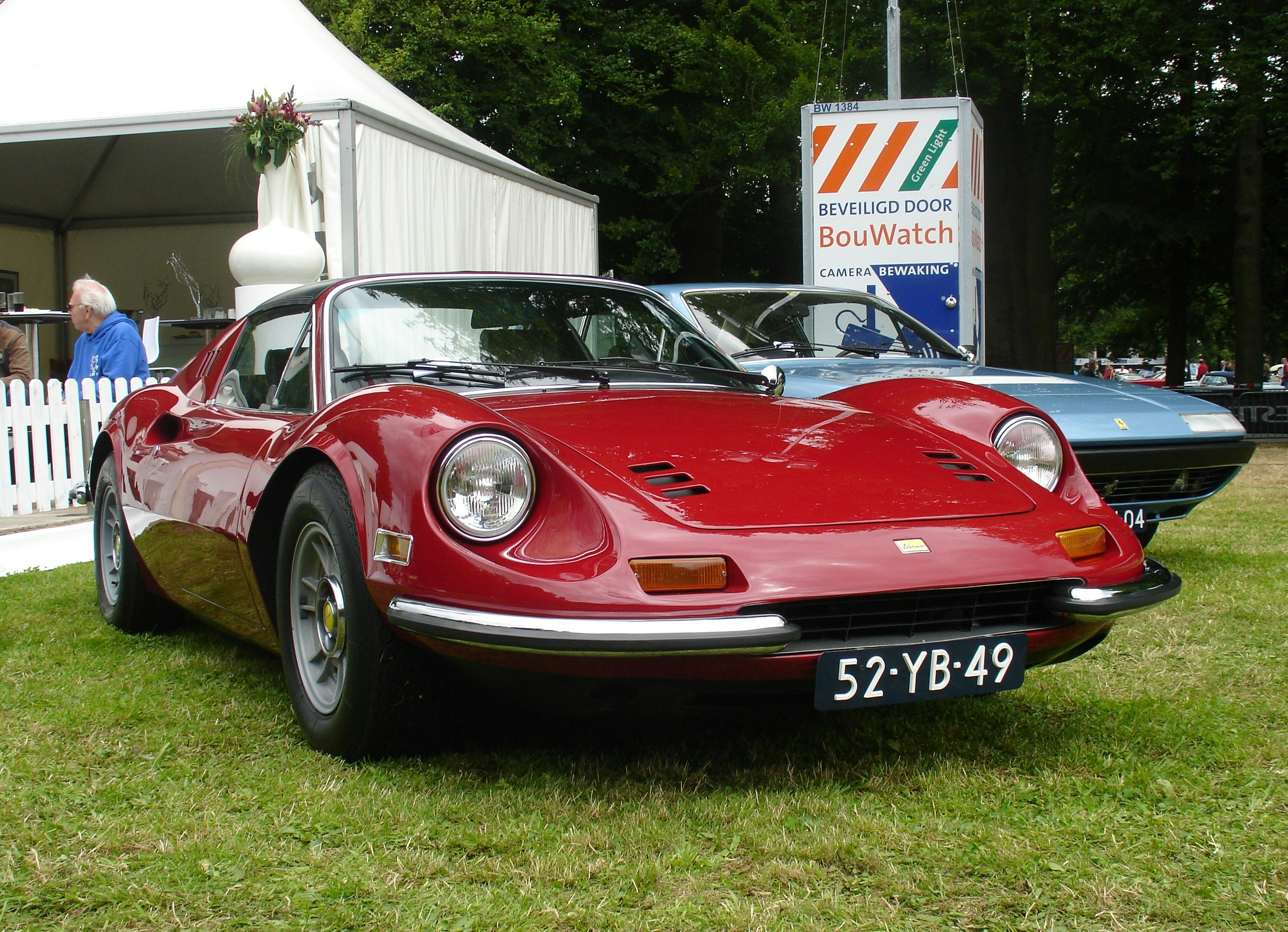 Red Classic Convertible at a Green Showground