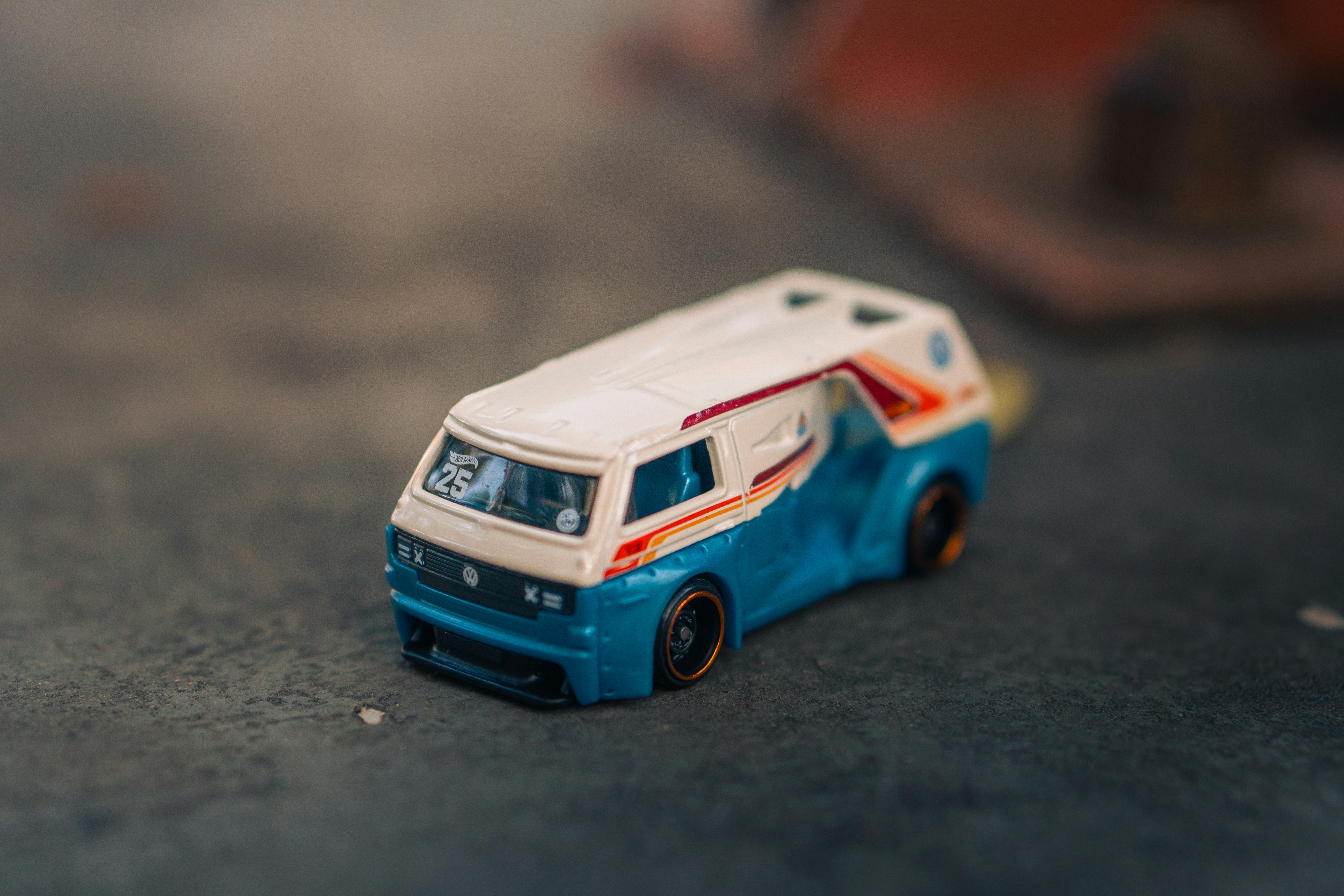 Tiny Ambulance, Big Focus: A Toy Van on a Weathered Surface