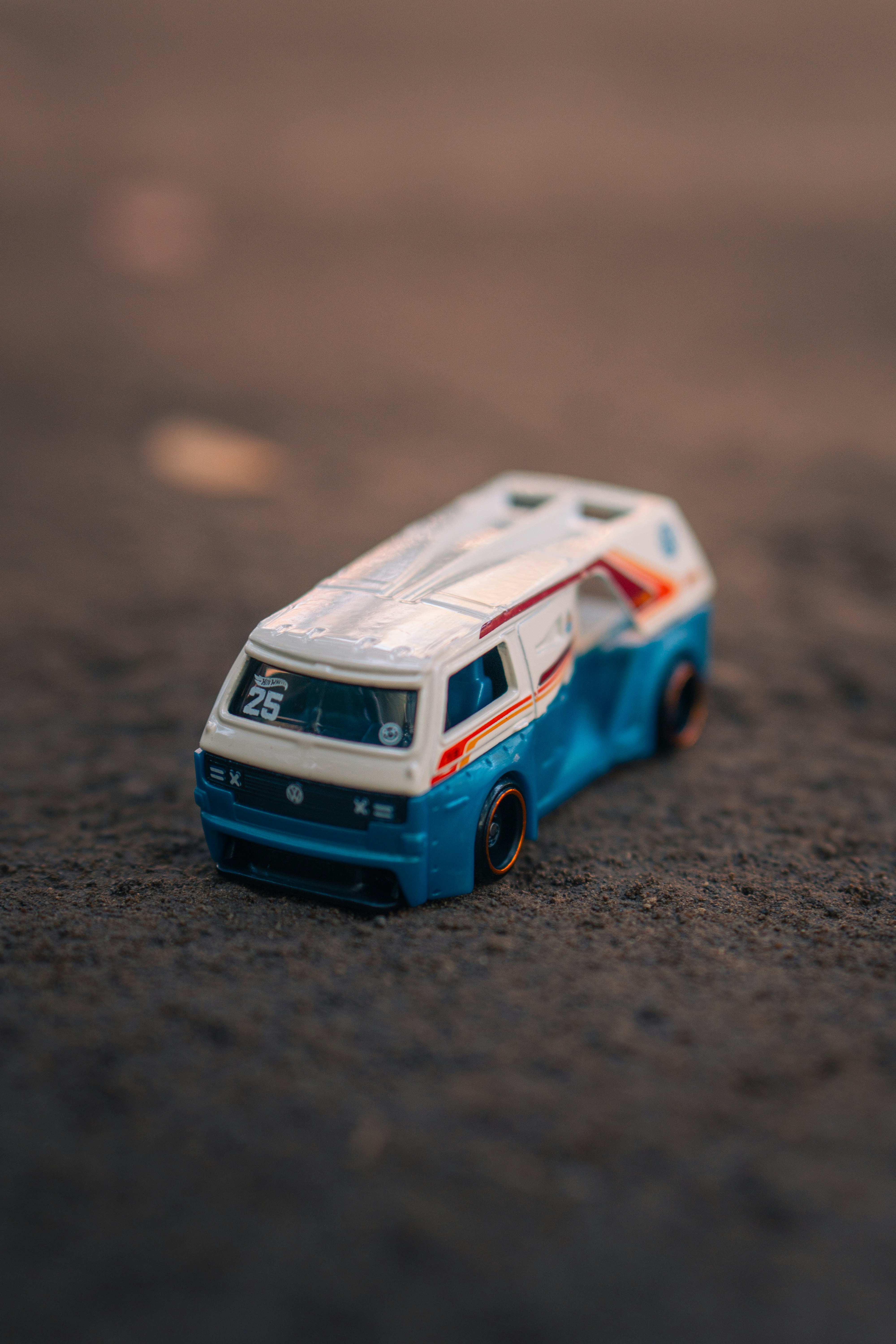 Tiny Van, Big Moment: A Toy Vehicle Takes Center Stage on Rough Terrain