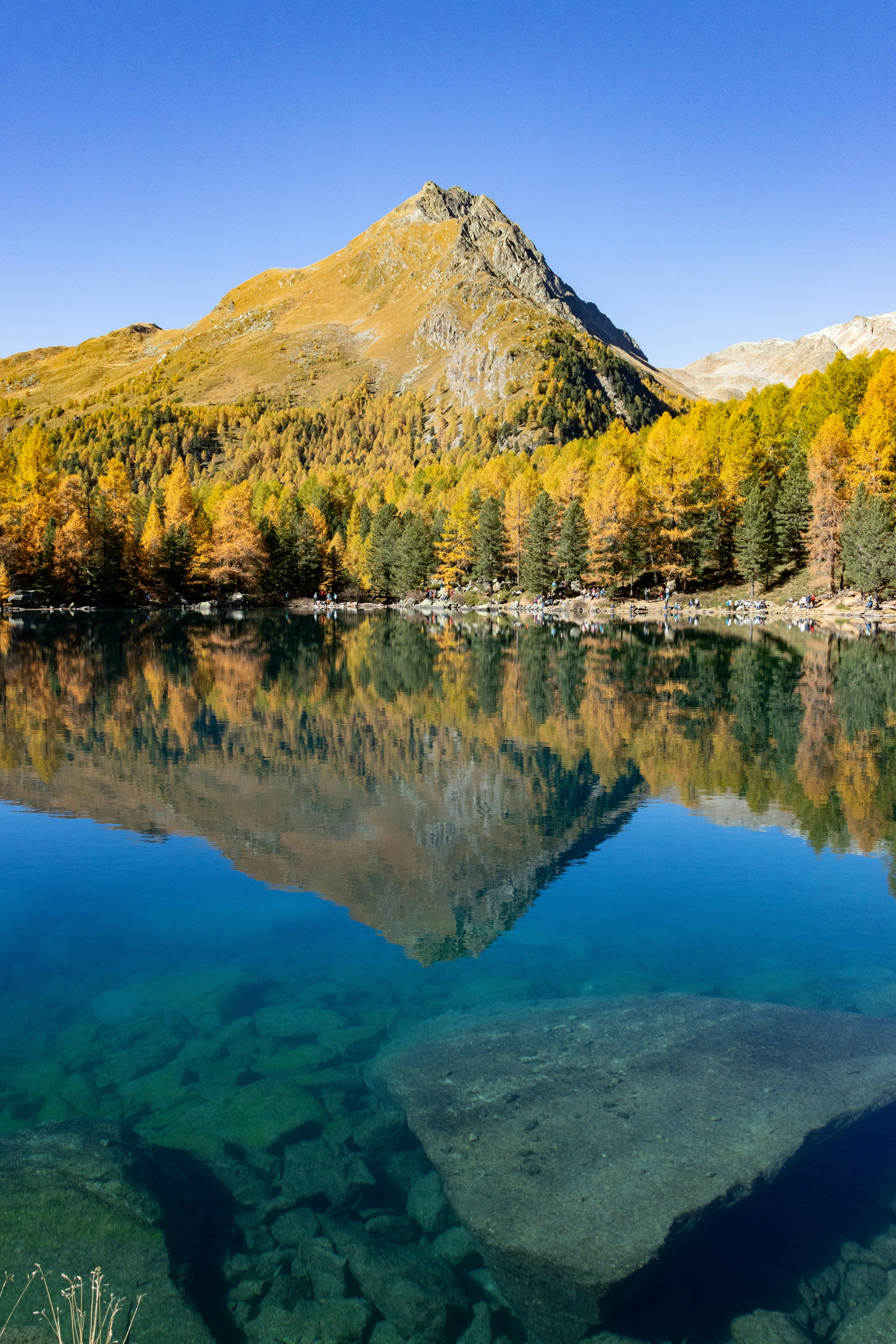Aurora Peak Over Calm Mirror: Autumn Mountain Lake