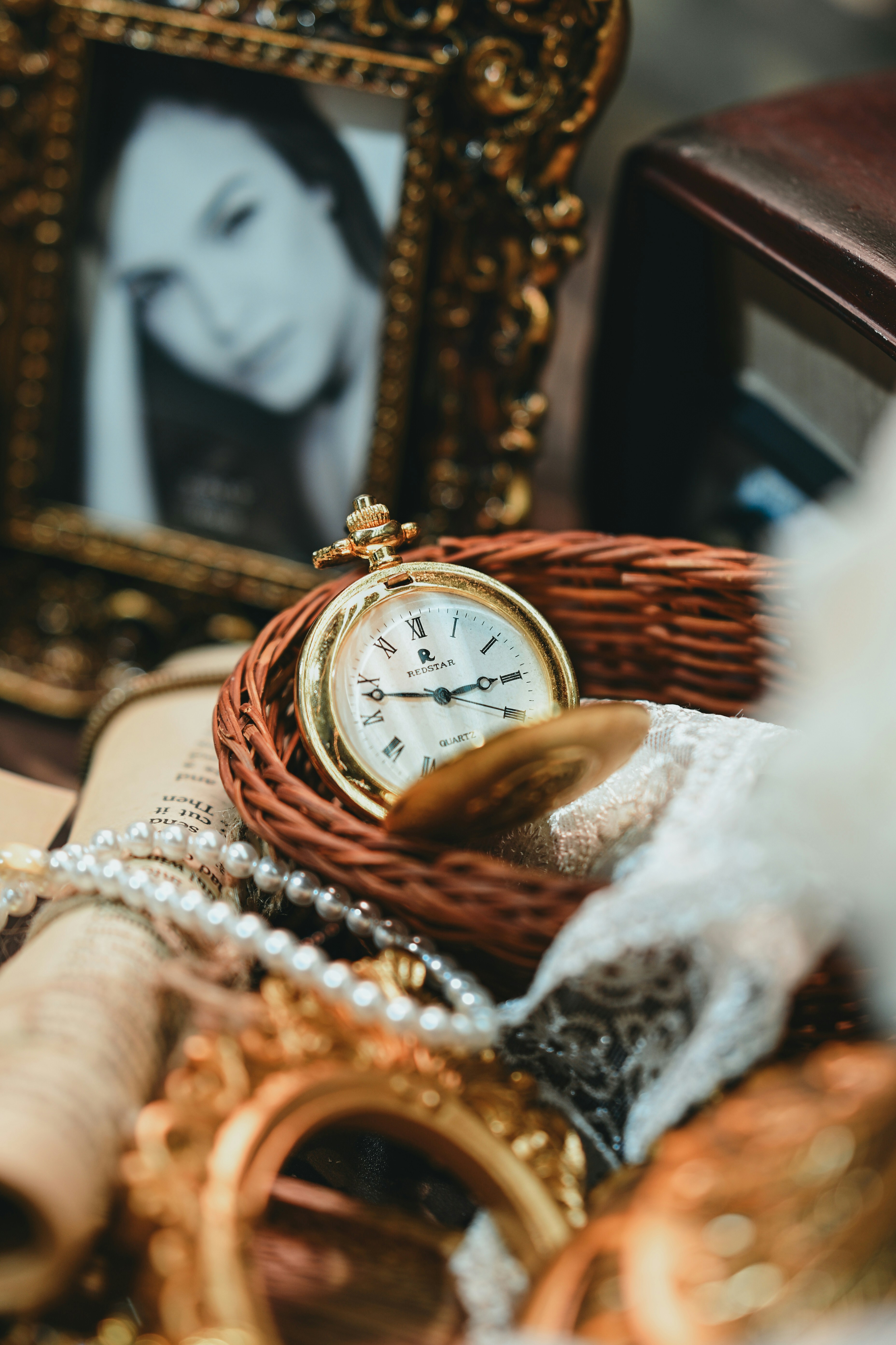 Gold, Glass, and Time: A Tucked Pocket Watch Among Velvet Keepsakes