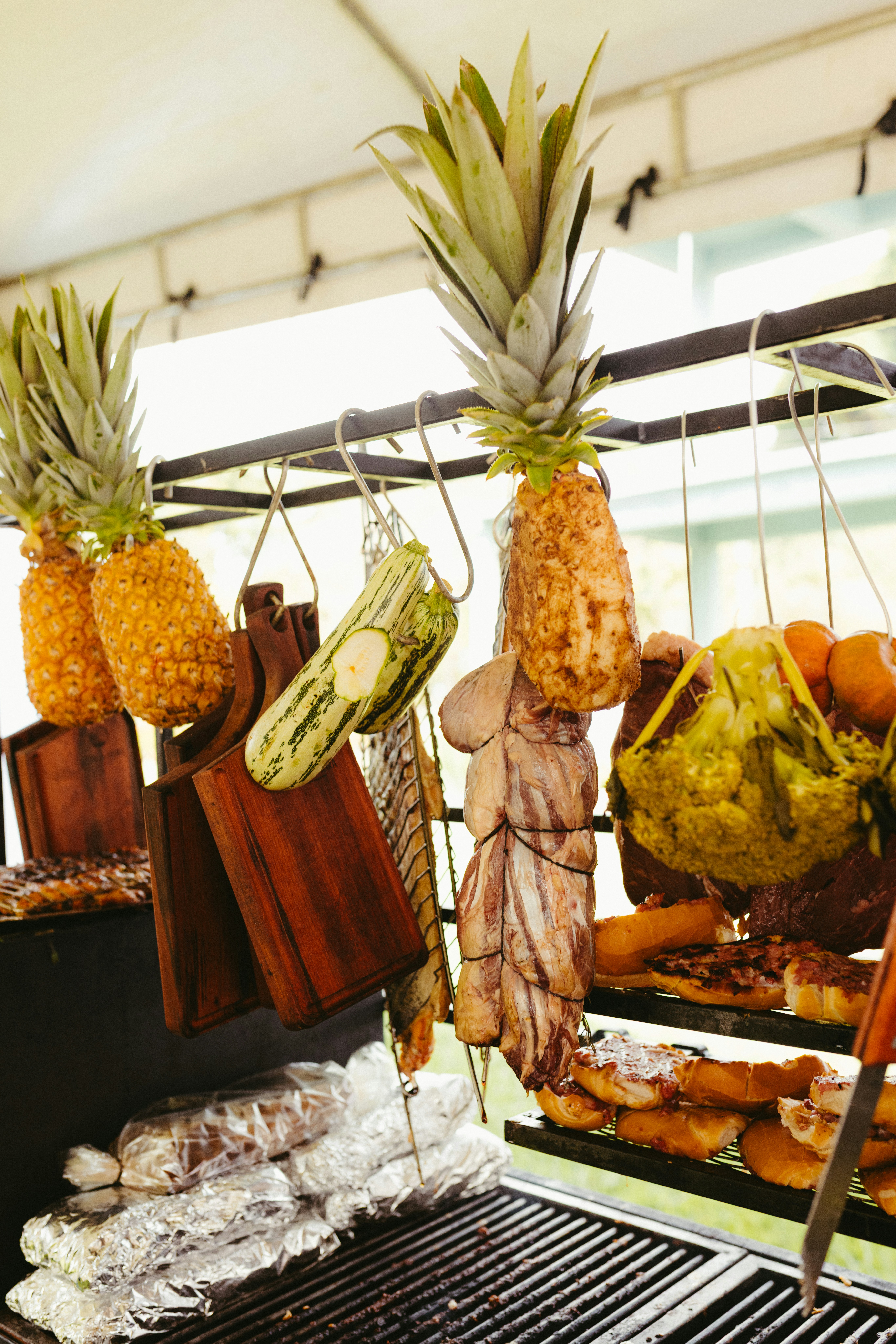 Hanging Harvest: Pineapples, Salumi, and a Grilling Parade