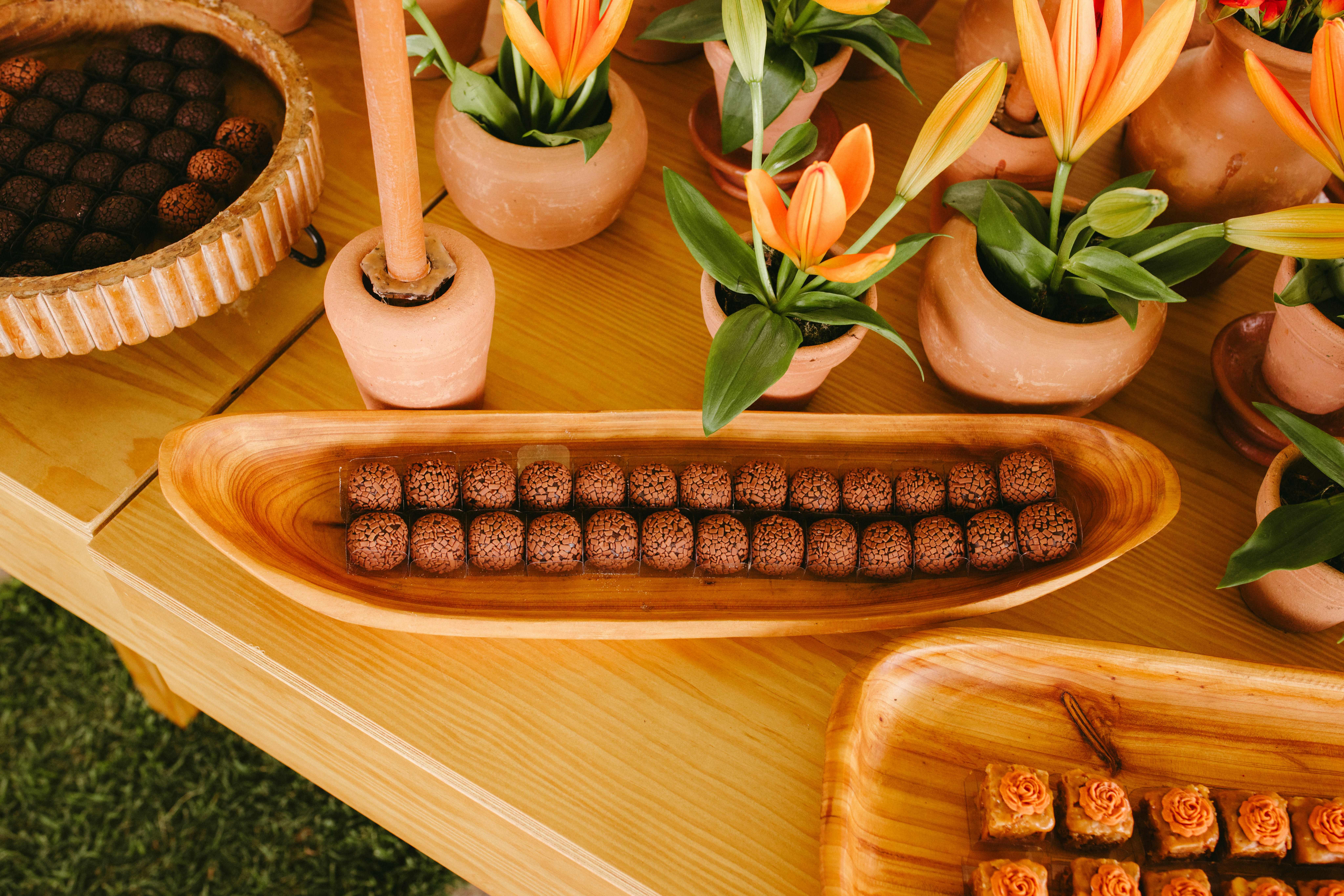 Wooden Tray of Cocoa Kazoo Bites on a Garden Table