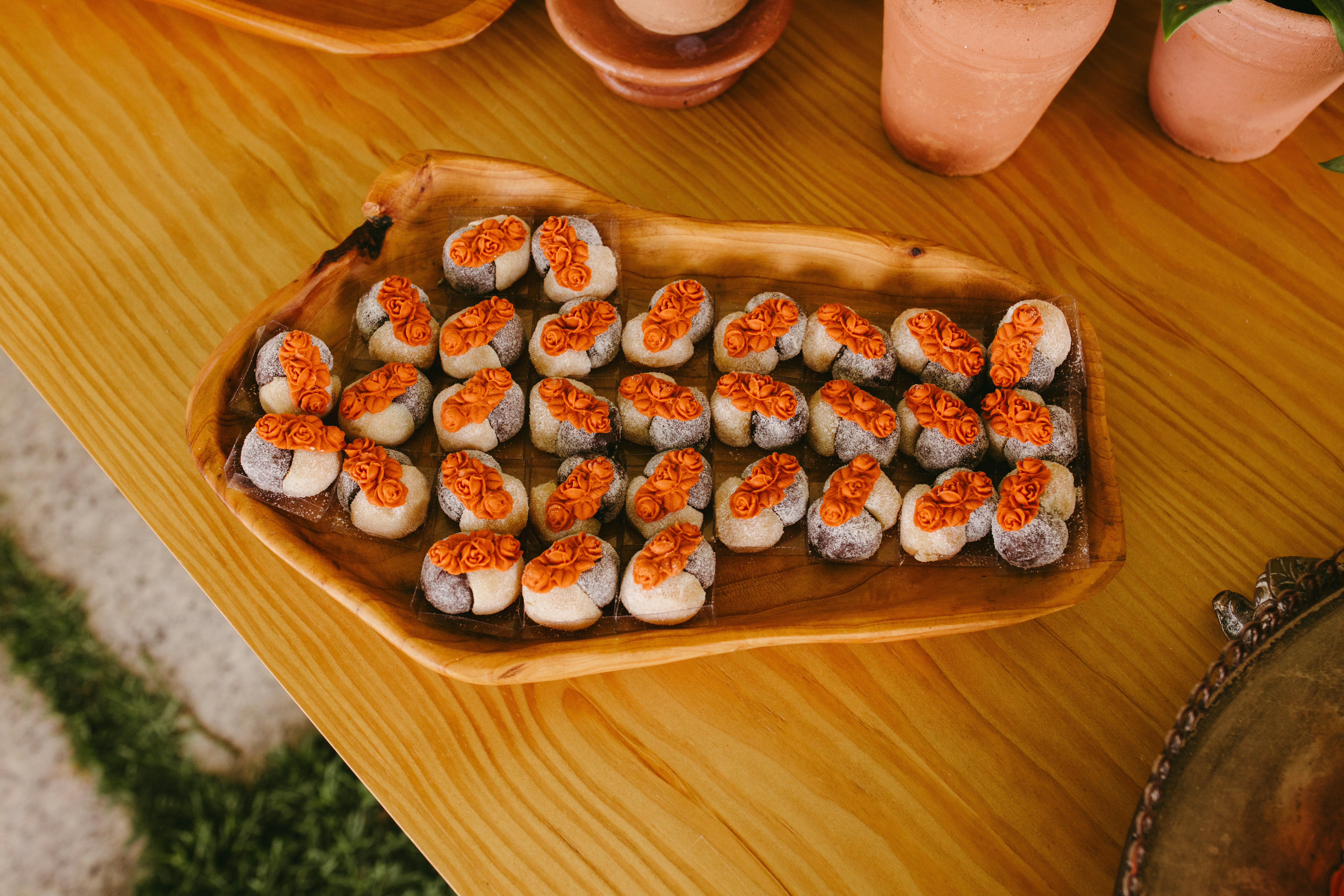 Orchid of Rolls: A Carved Wooden Tray of Spiced Sushi Rolls