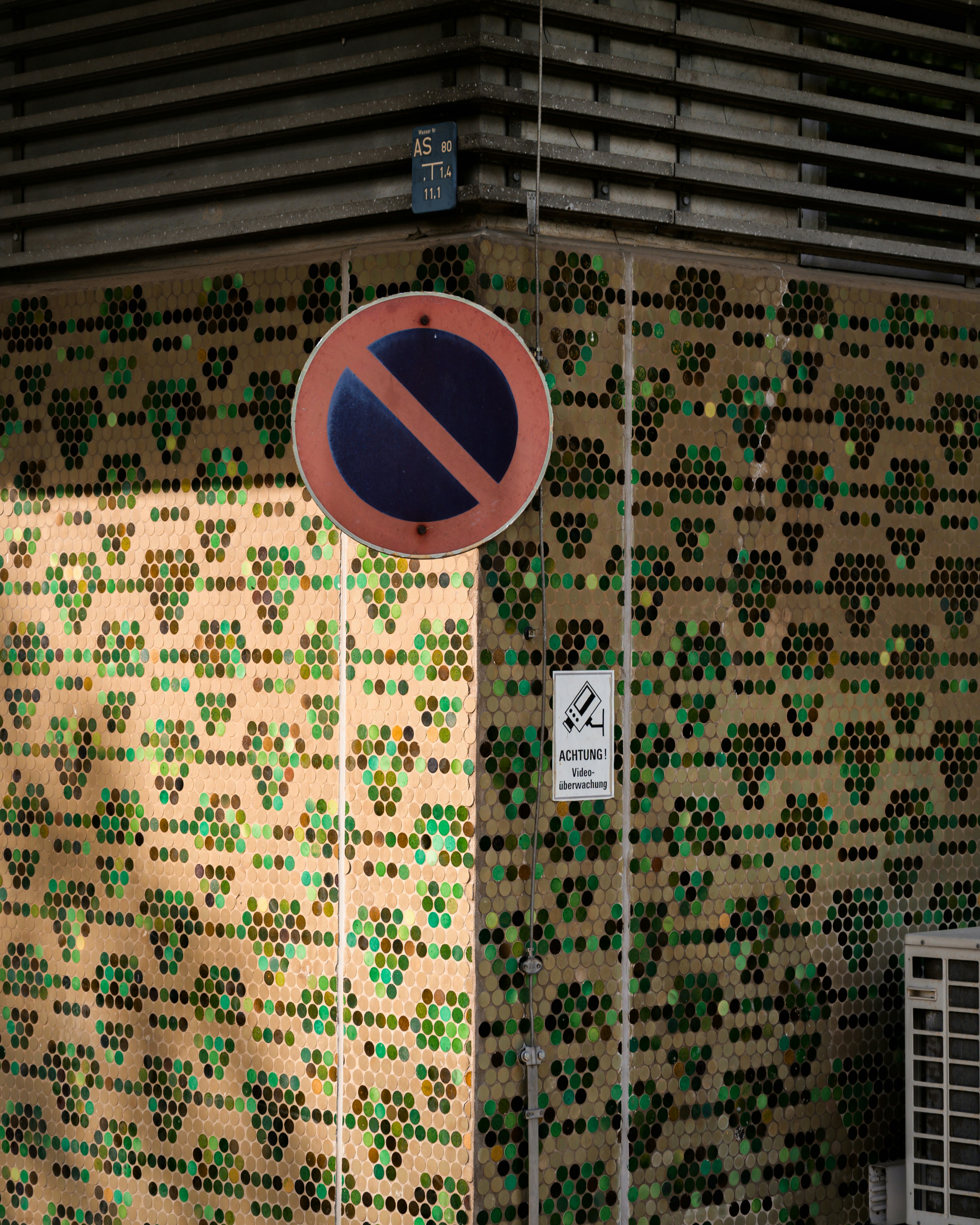 Mosaic Facade and a Silent No-Stopping Sign