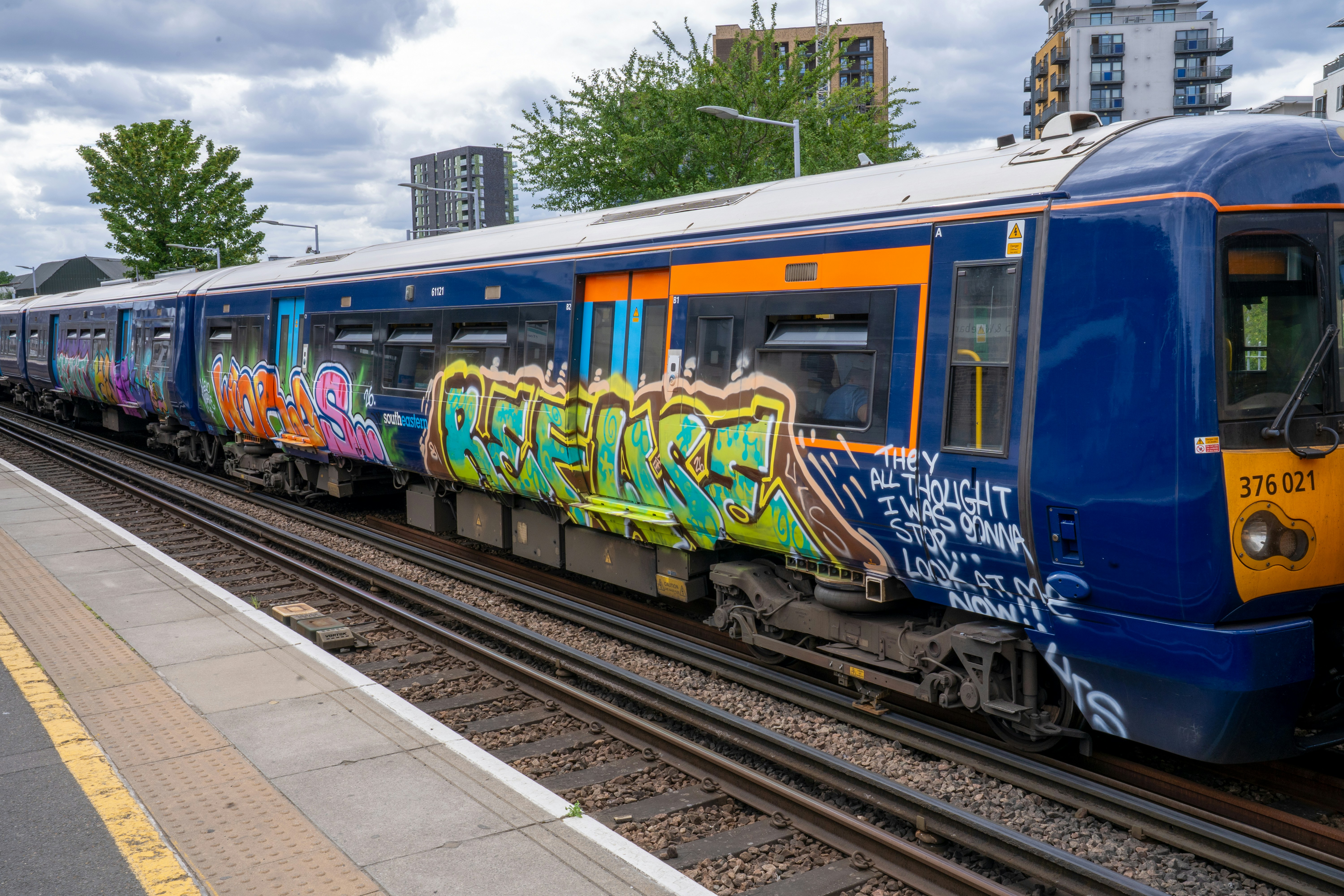 Graffitied Carriage: Urban Train Portrait on a Graffiti Subway