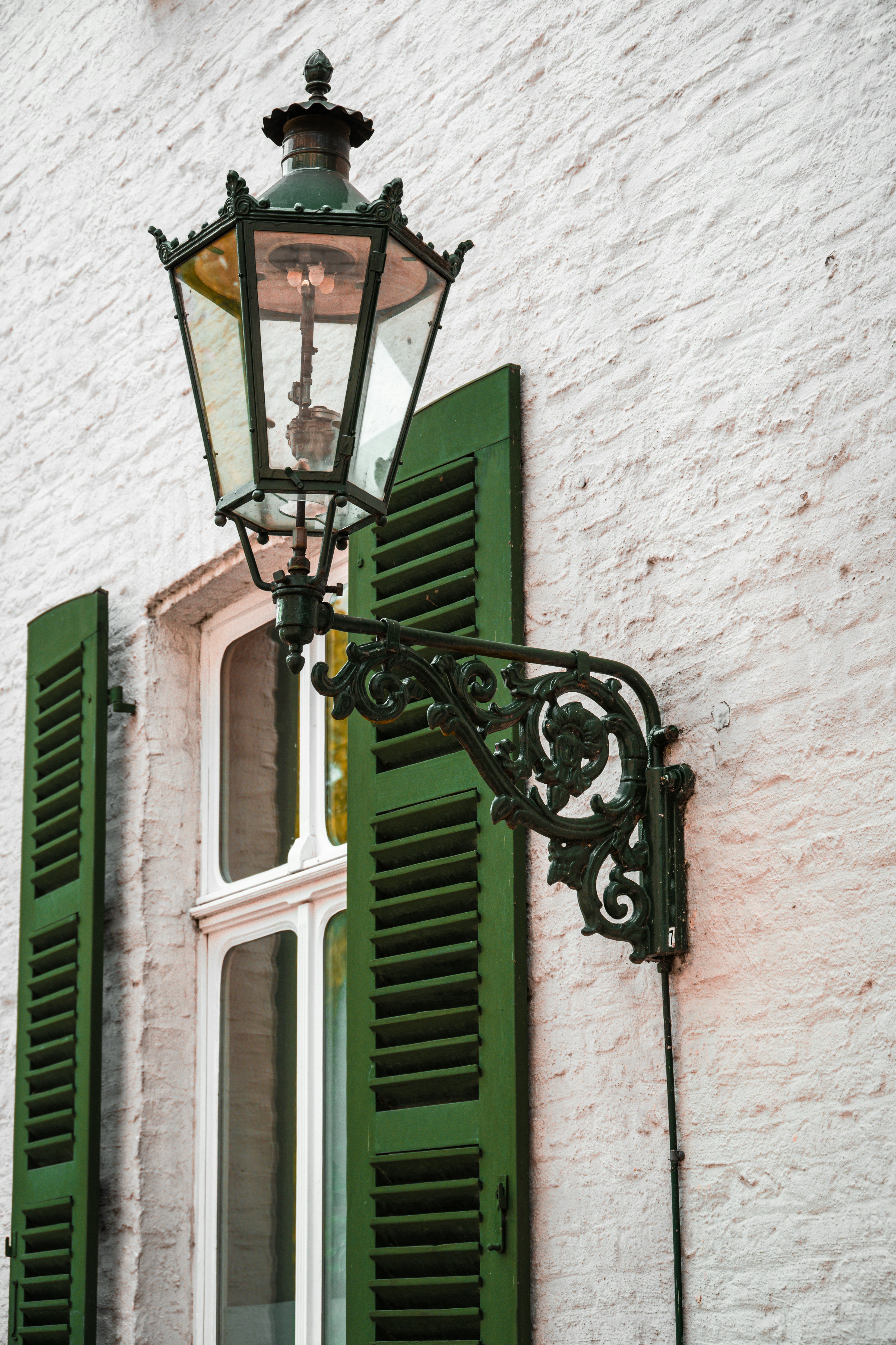 Heritage Lantern on a Charmingly Worn Facade