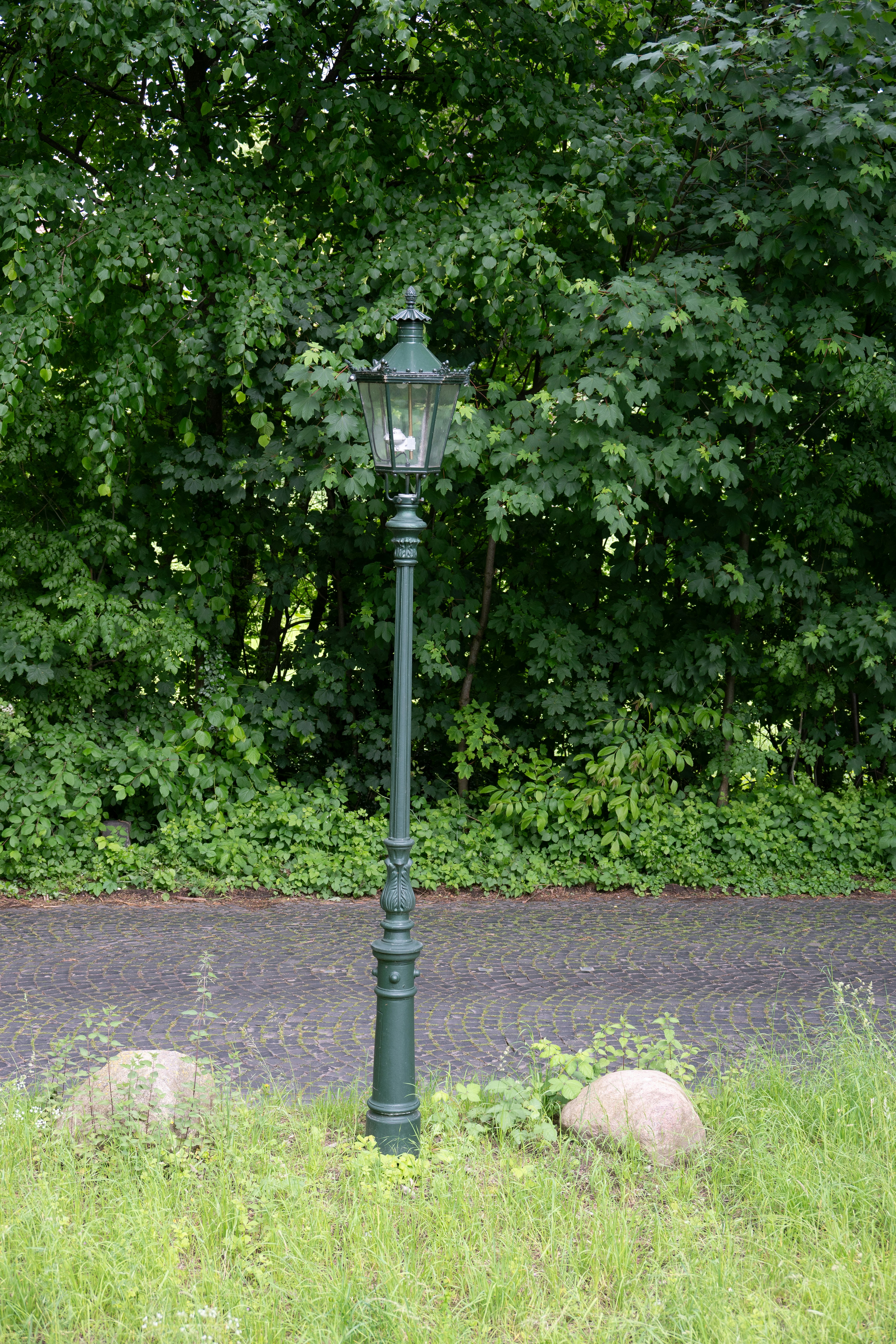 Vintage Lantern Standing Guard Over a Quiet Path