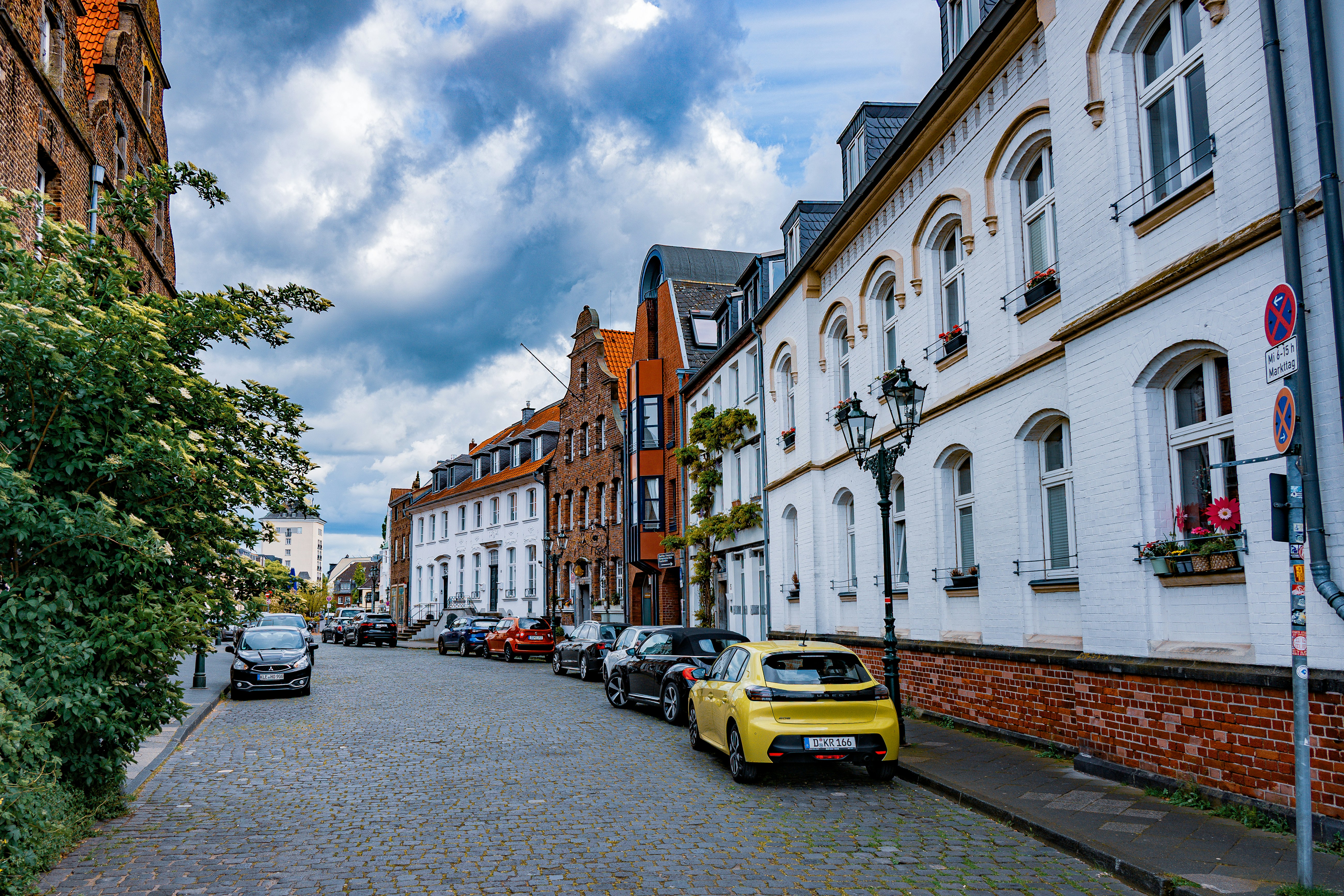 Colorful Street Canyon: A Calm Cobbled Lane Between Historic Buildings