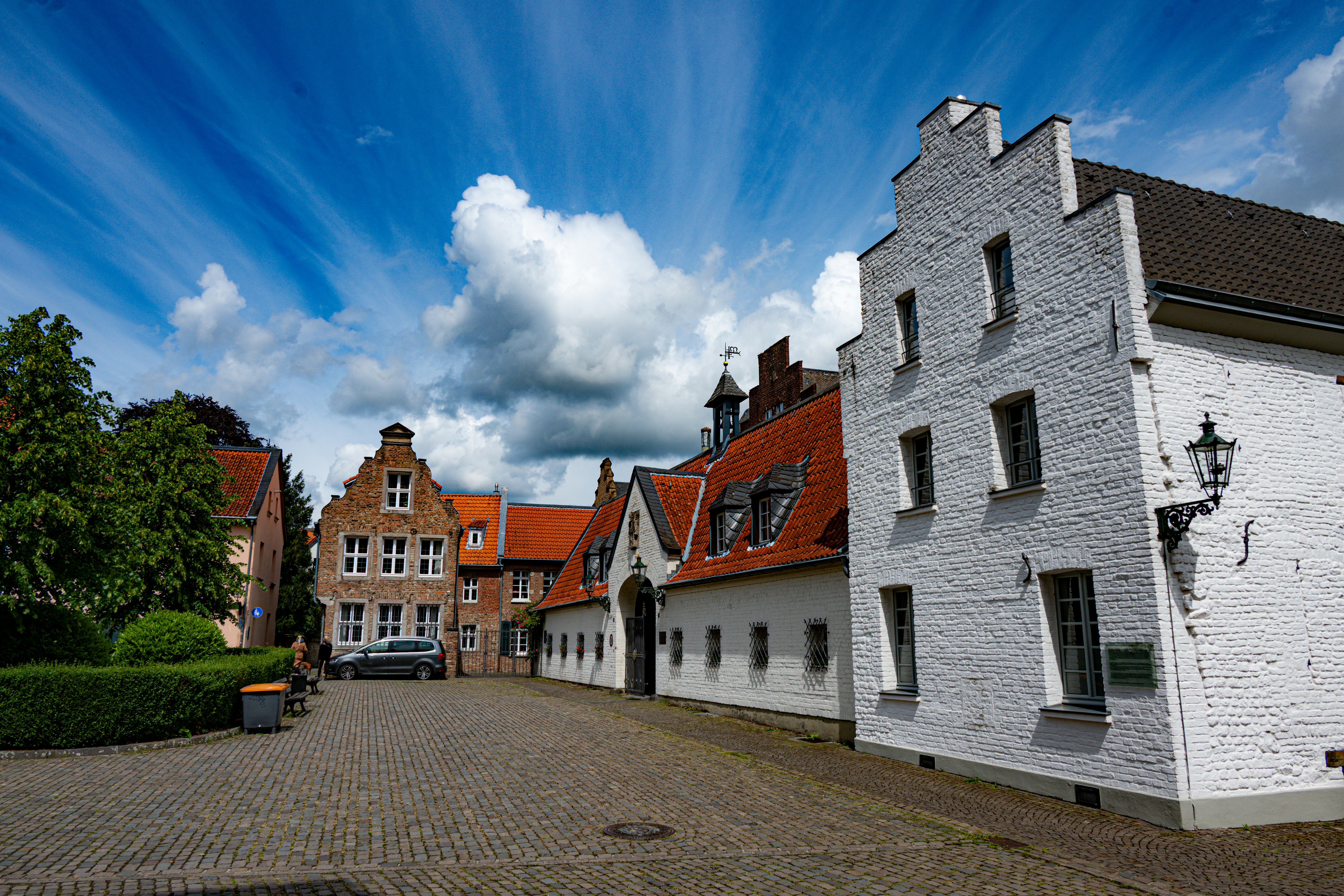 Cobbled Street Meets White-Wall Charm