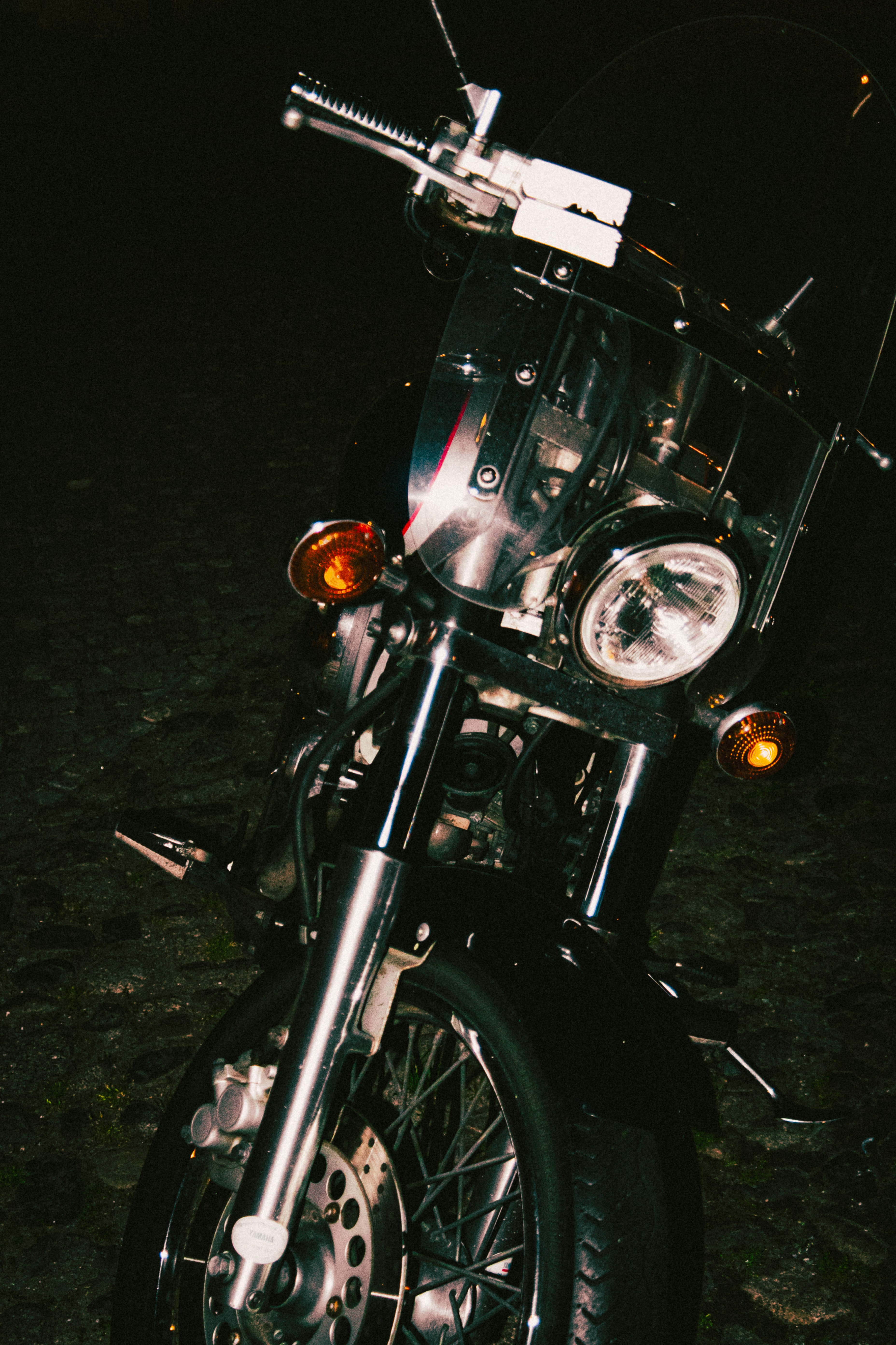 Night-Warden: A Front-On Glimpse of a Classic Motorcycle