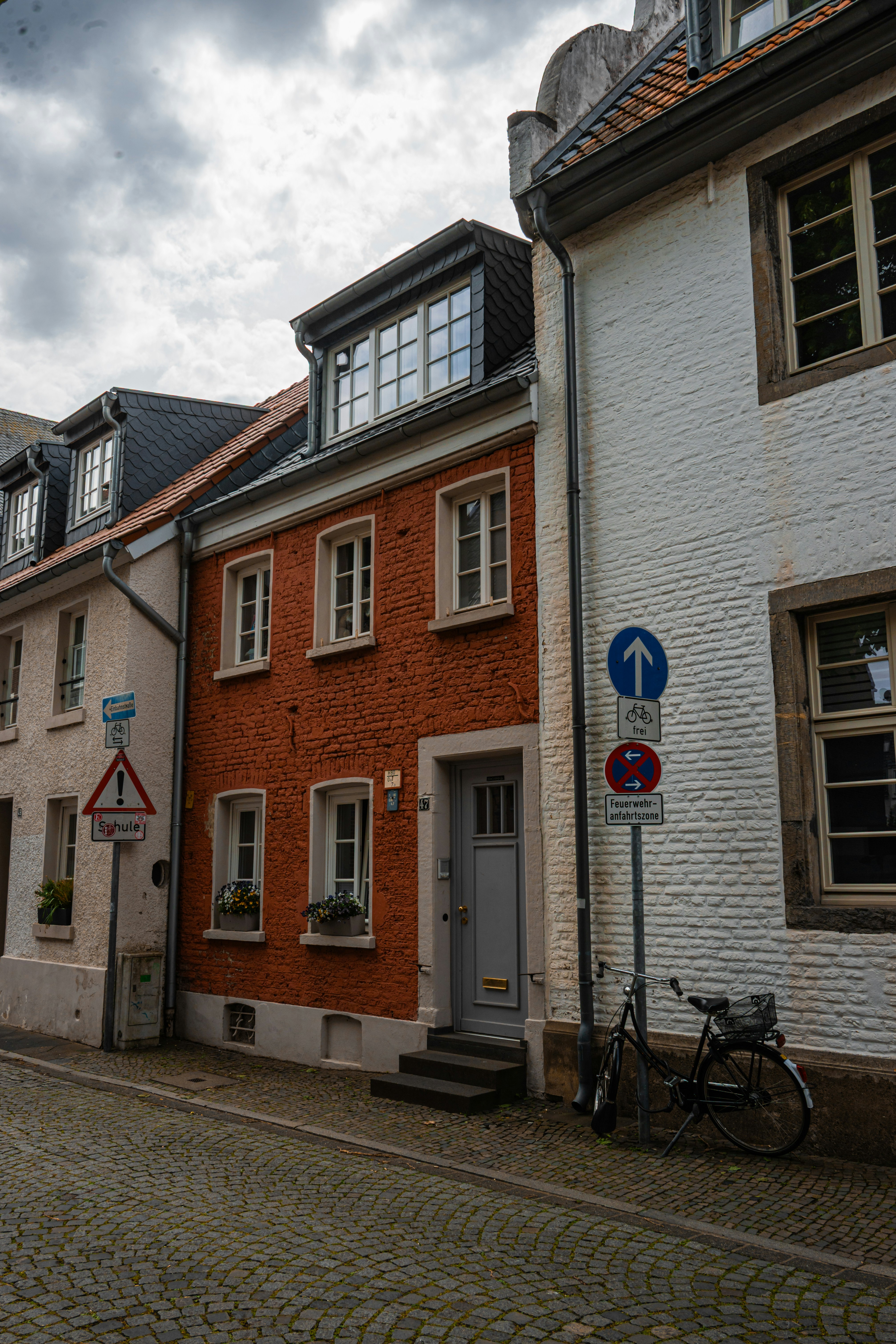 Brick-and-Stone Facades on a Quiet Cobblestone Street