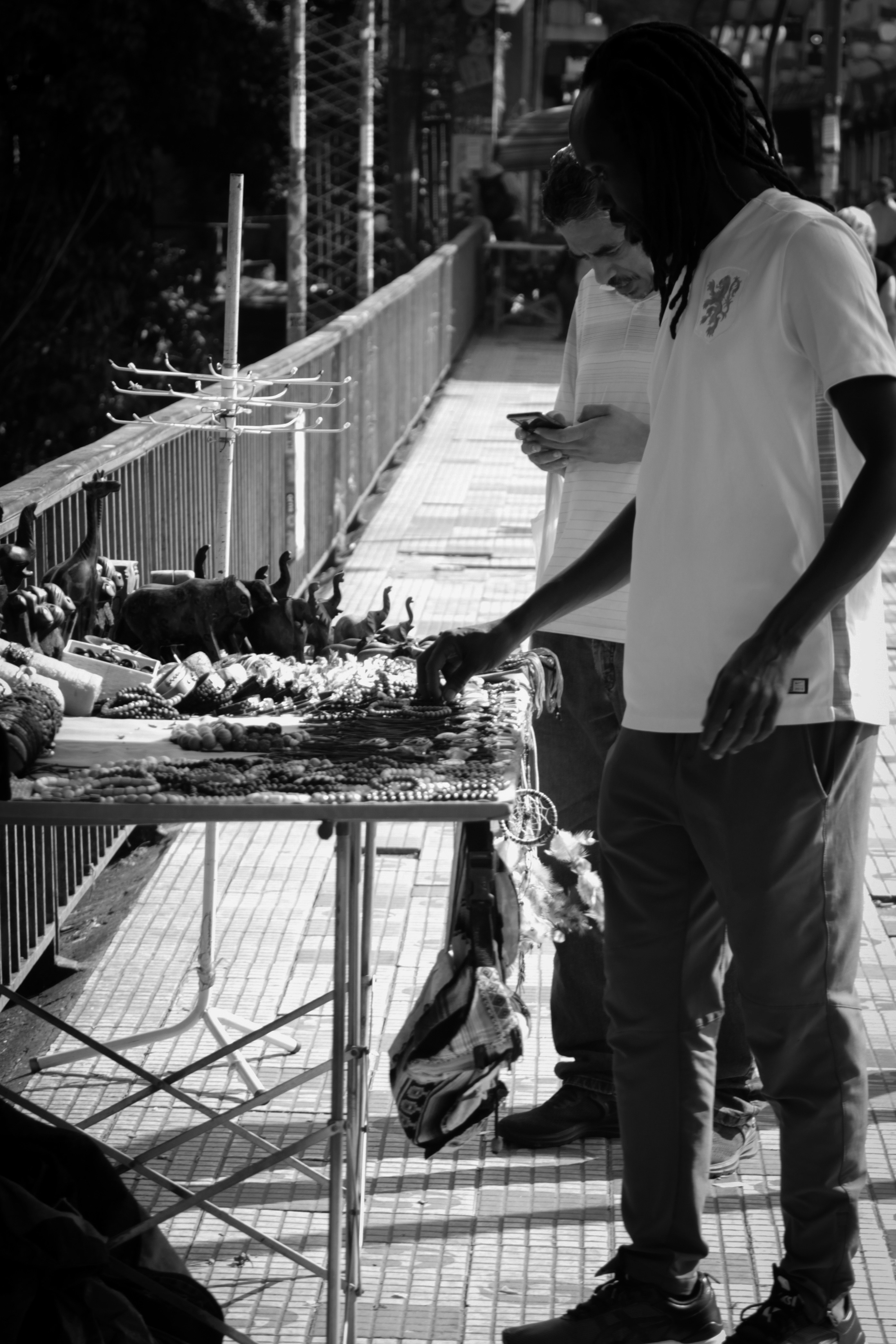 Street Market Portrait: Hands of Craft in Focus