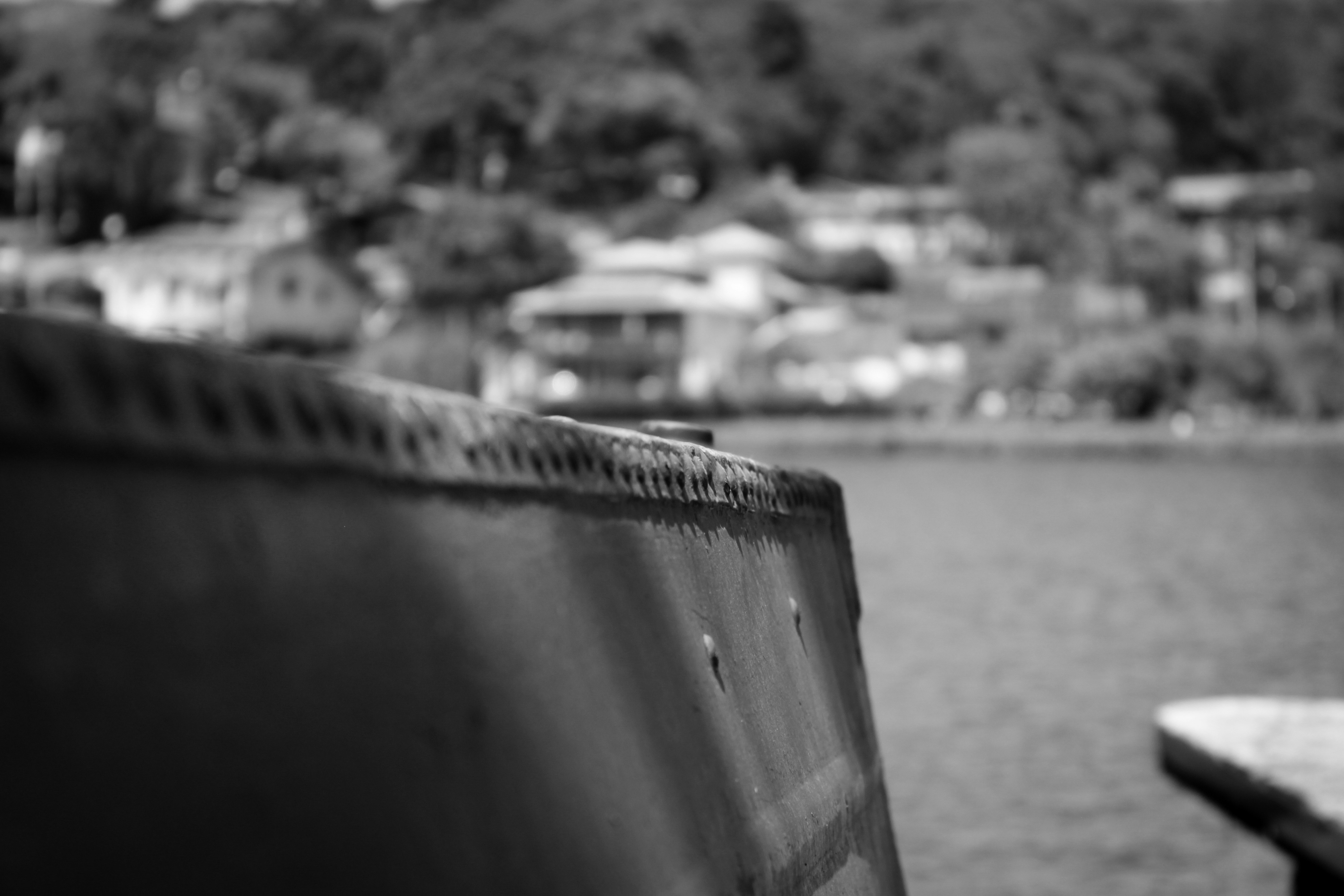 Iron Shoreline: The Hull at Rest by the Quiet Lake