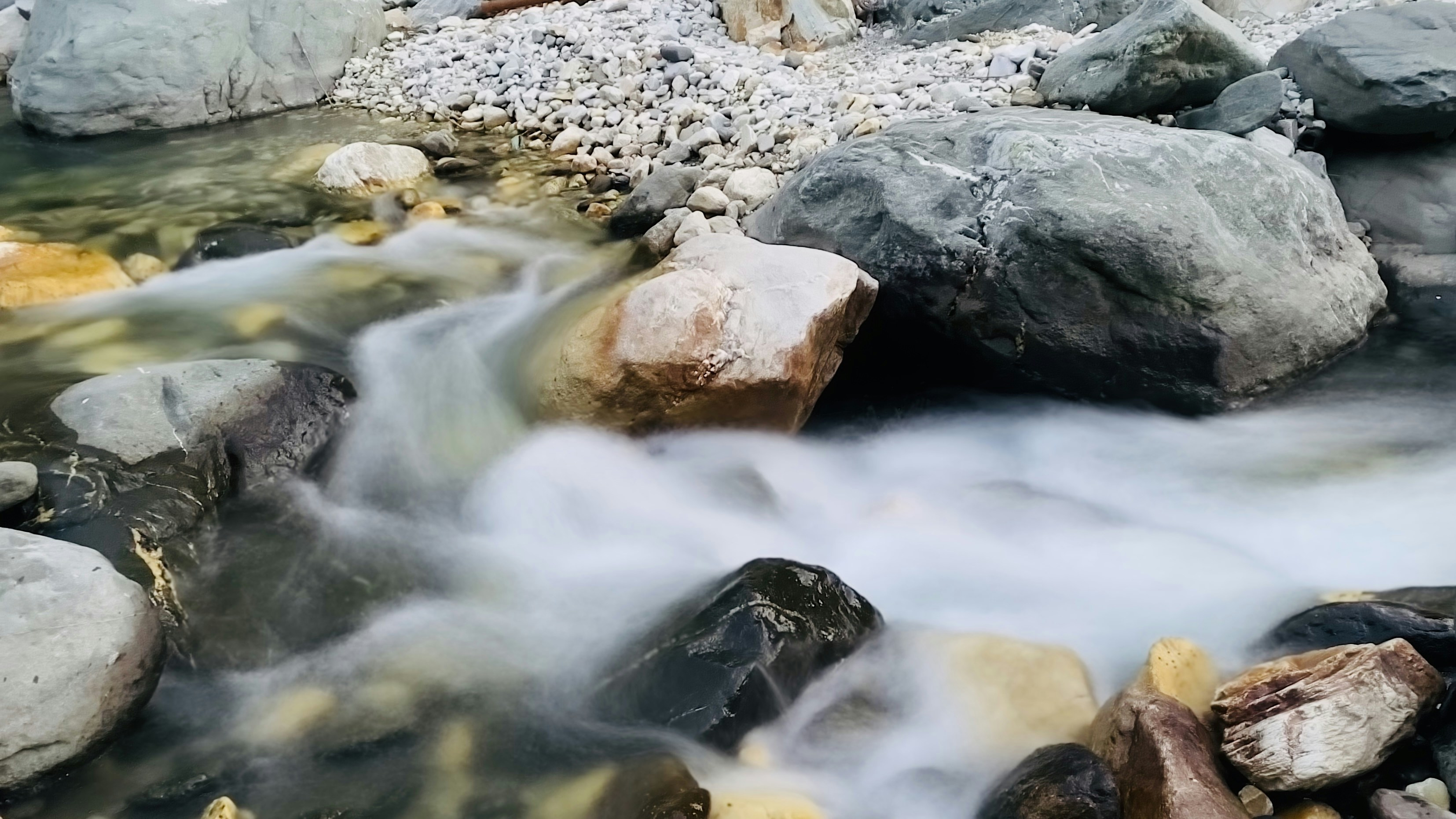 Whispering Rocks: A Shallow Dance of a Mountain Stream
