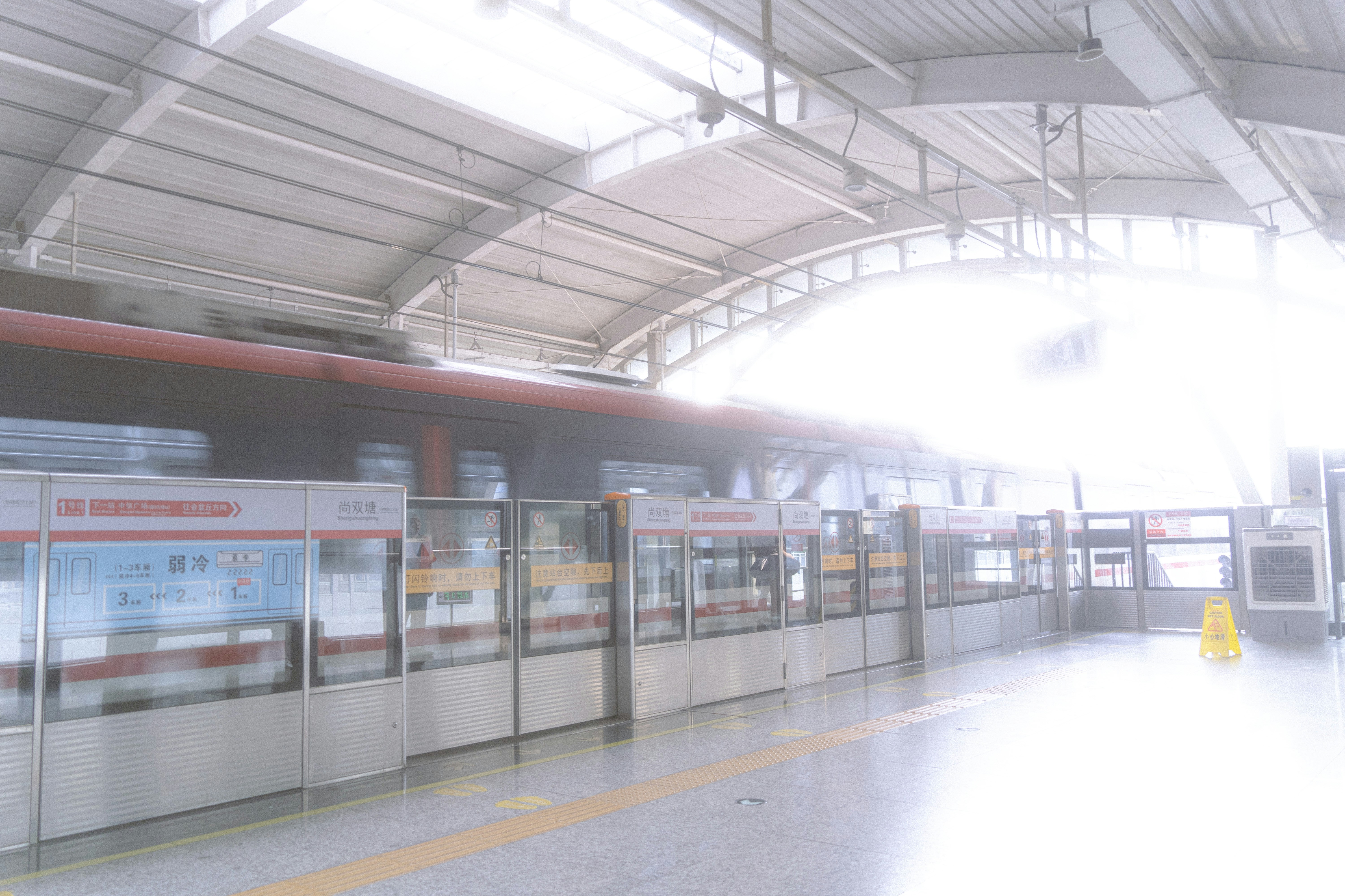 Overexposed Station Line: Bright Haze Across a Modern Platform