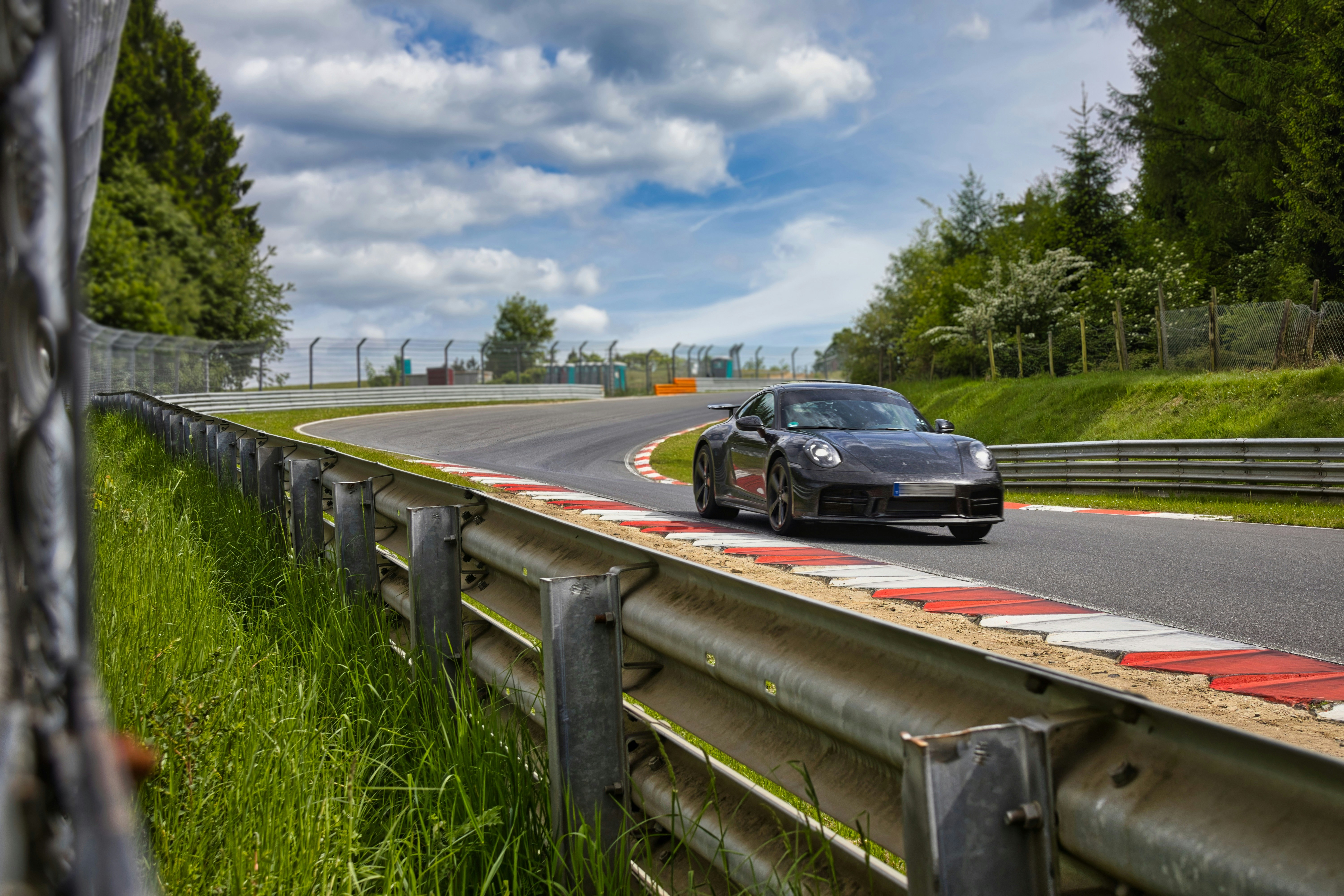 A Mustang Rounds the Curve: Raceway Grip on a Sunlit Day