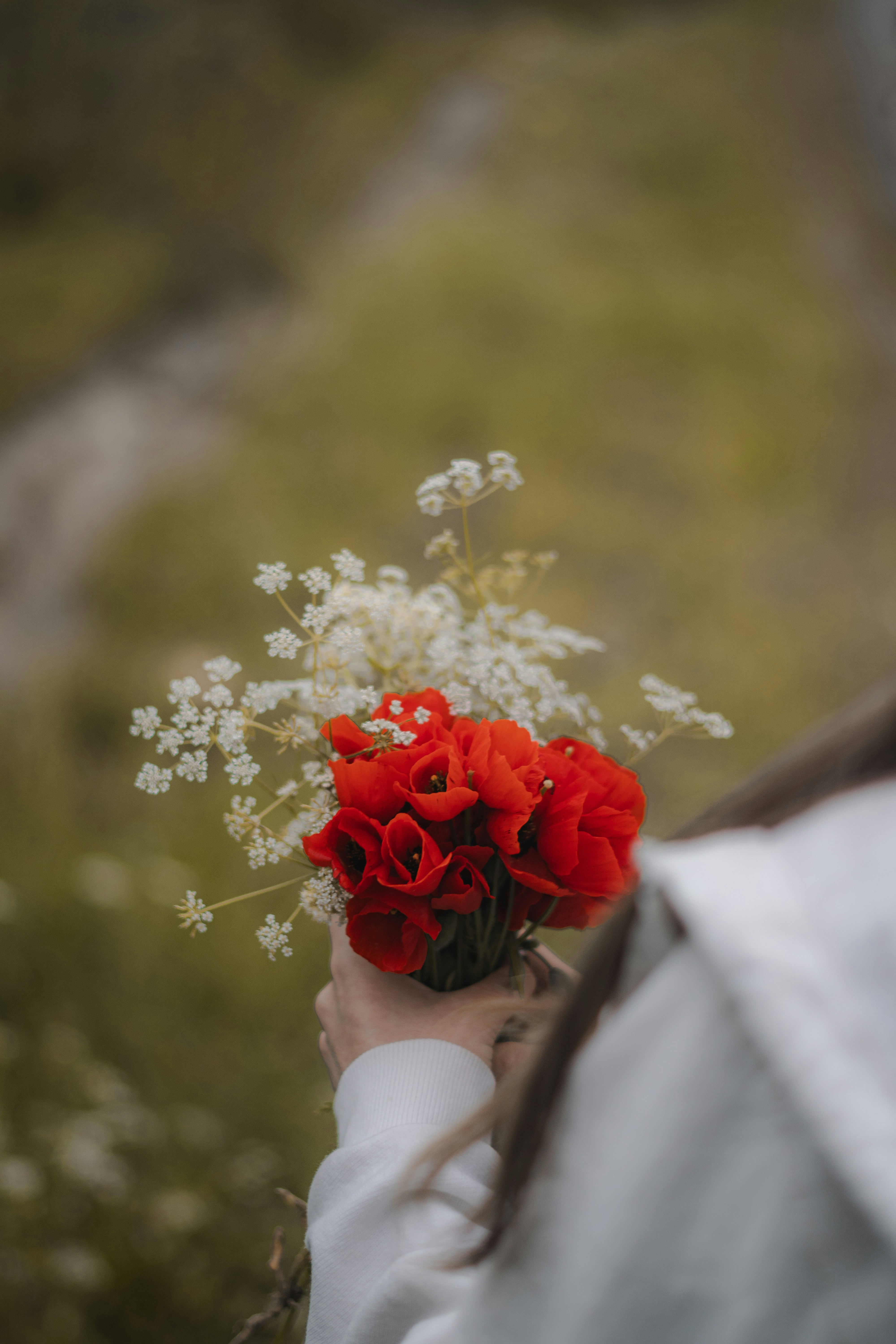 Ruby Blooms in Handful of White Dust