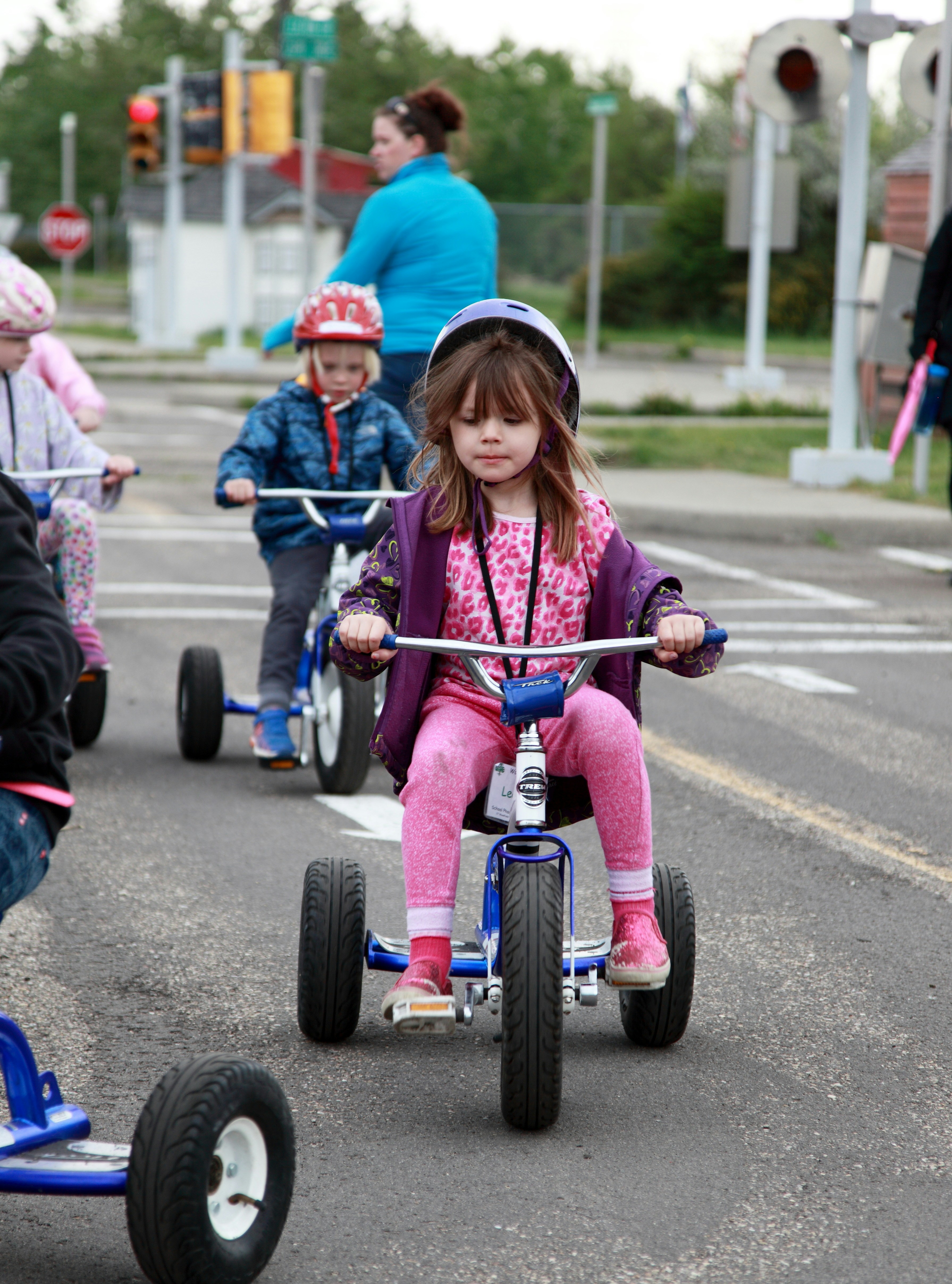 Little Cyclist at the Front: A Courageous Ride Down the Street