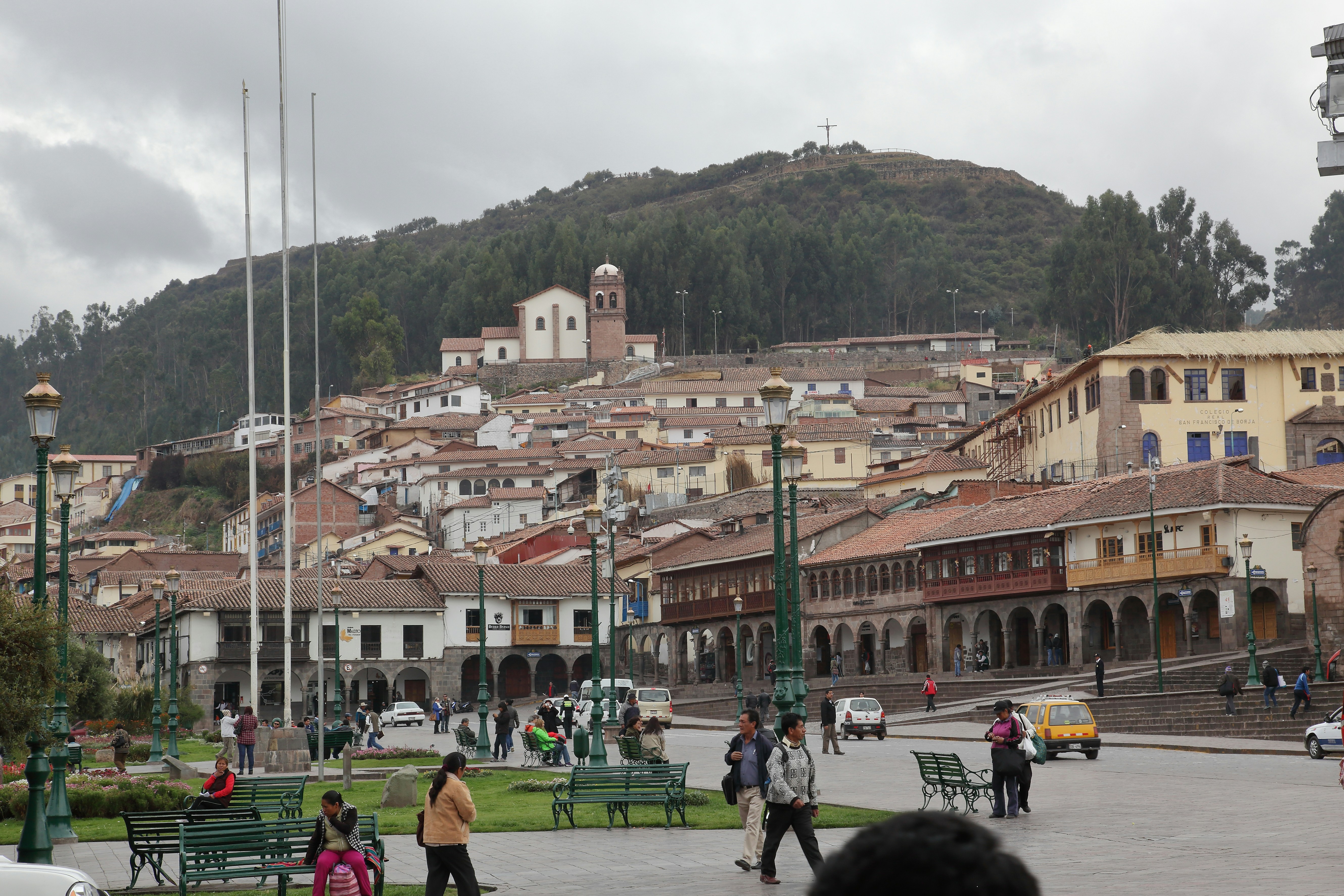 A Courtyard of Hues: Village Square Beneath the Hilltop Church