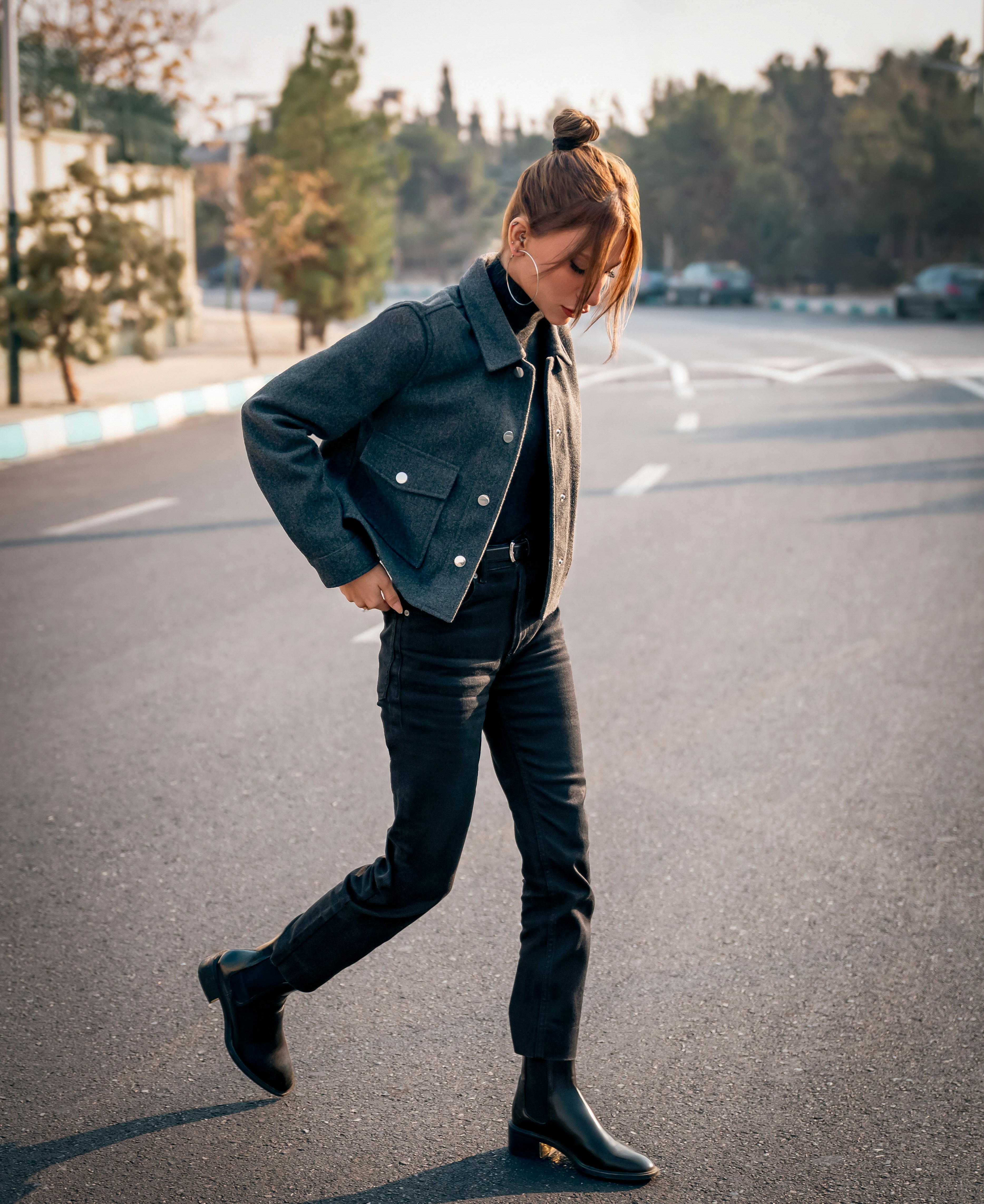 Stride of Confidence: A Street Portrait in Quiet Motion