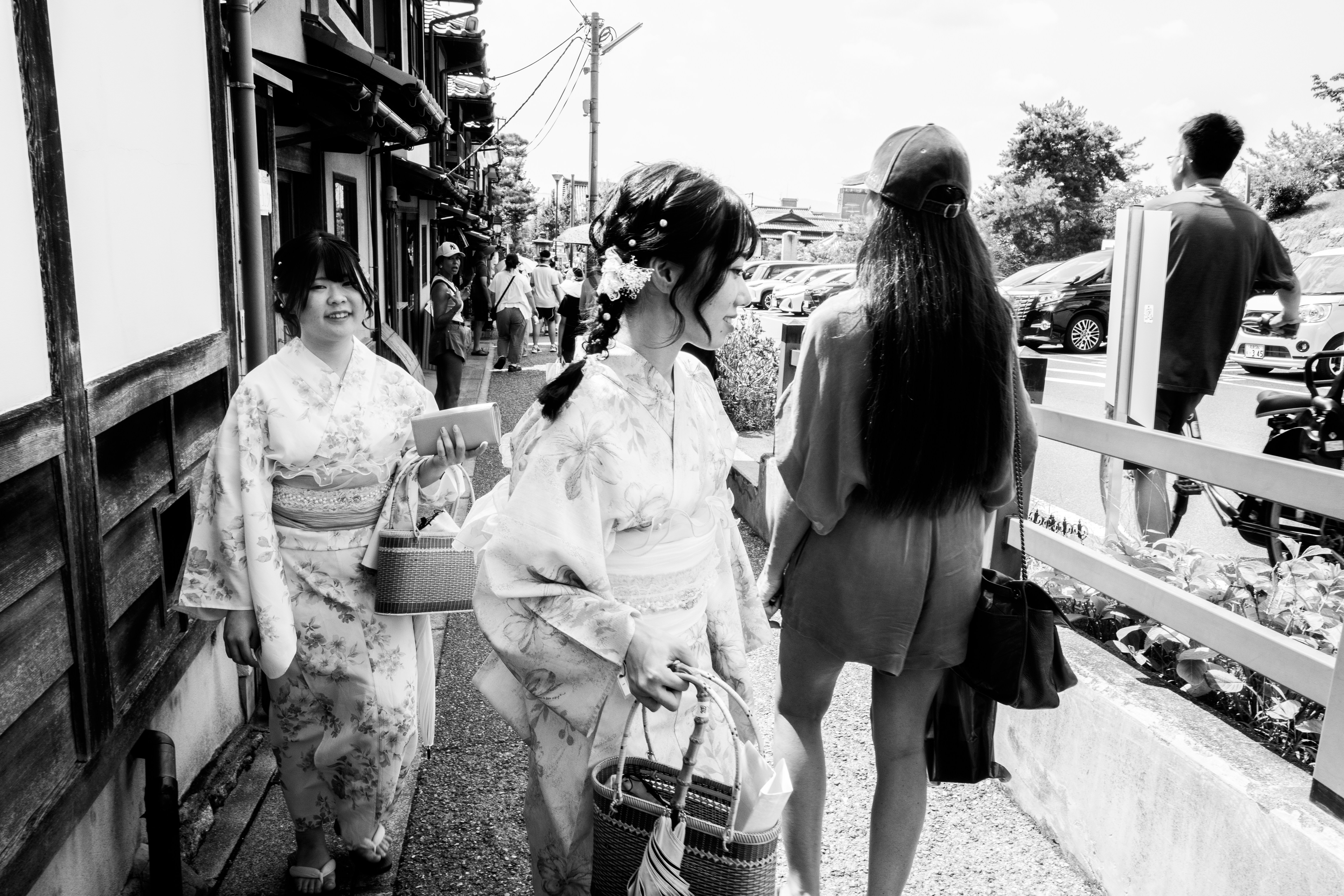 Silhouettes in Silk: Women in a Traditional Japanese Street