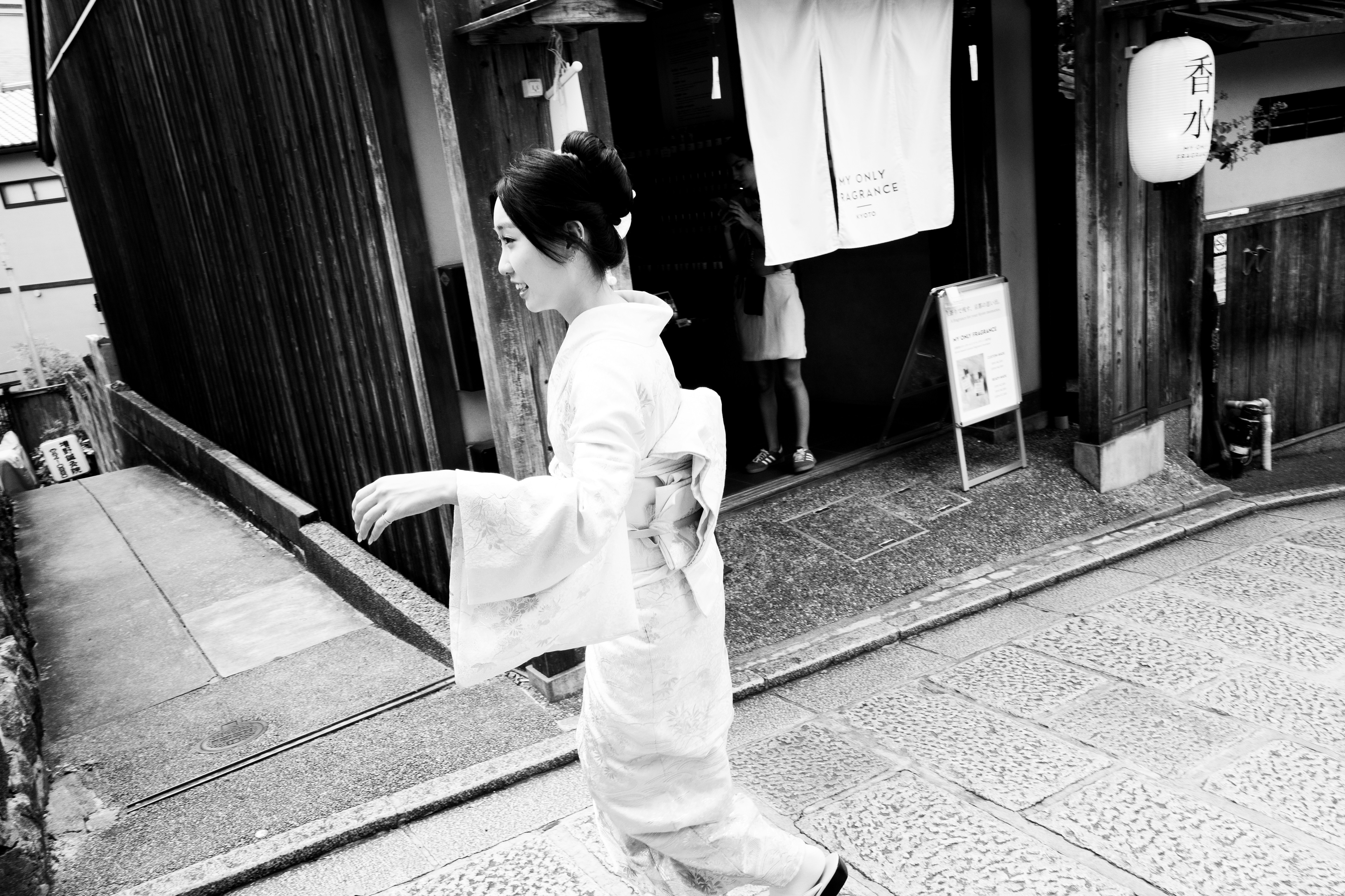 Graceful Motion: A Kimono Walk Through a Quiet Street