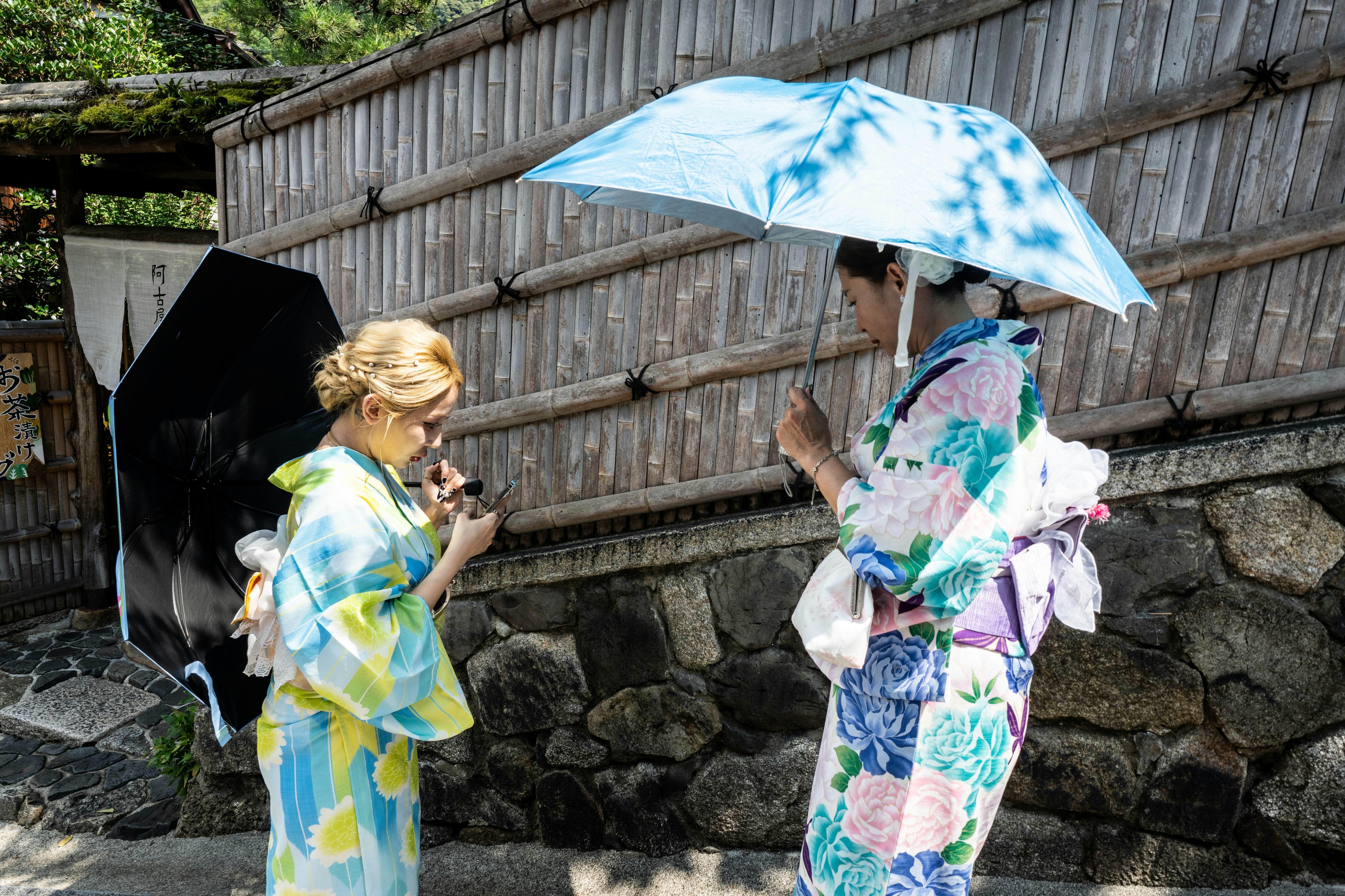 Blue-Patterned Kimono Exchange under Parasol Light