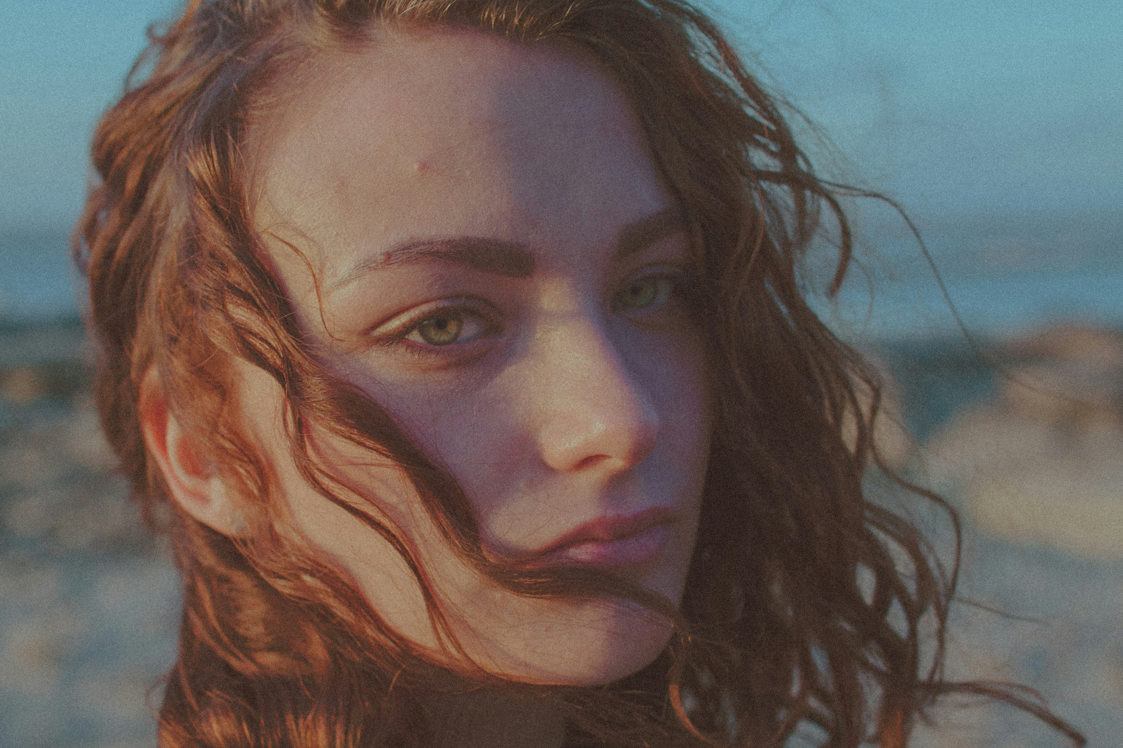 Wind-kissed Gaze on a Coastal Portrait