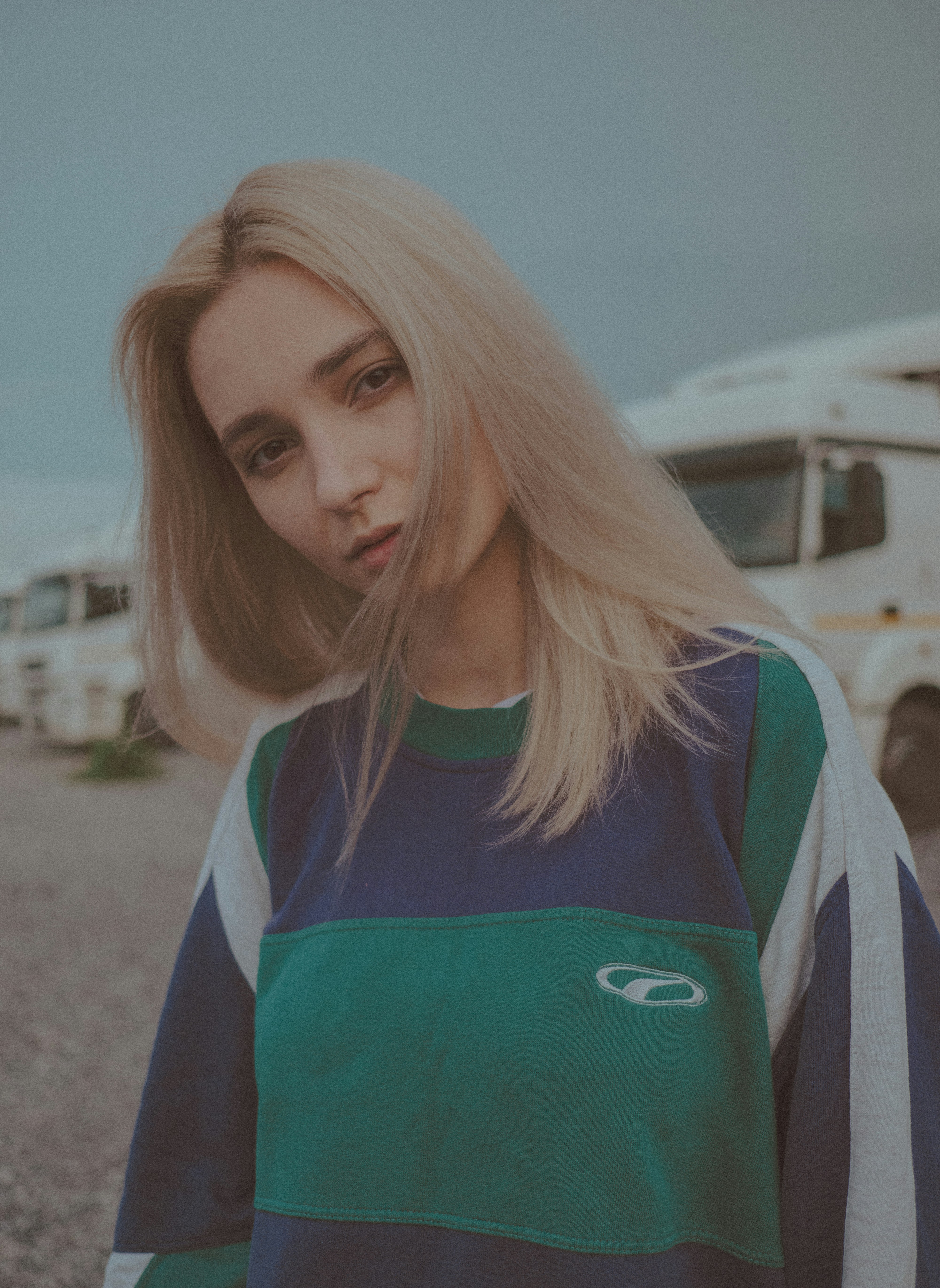 Blonde Portrait in Soft Evening Light by the Vans