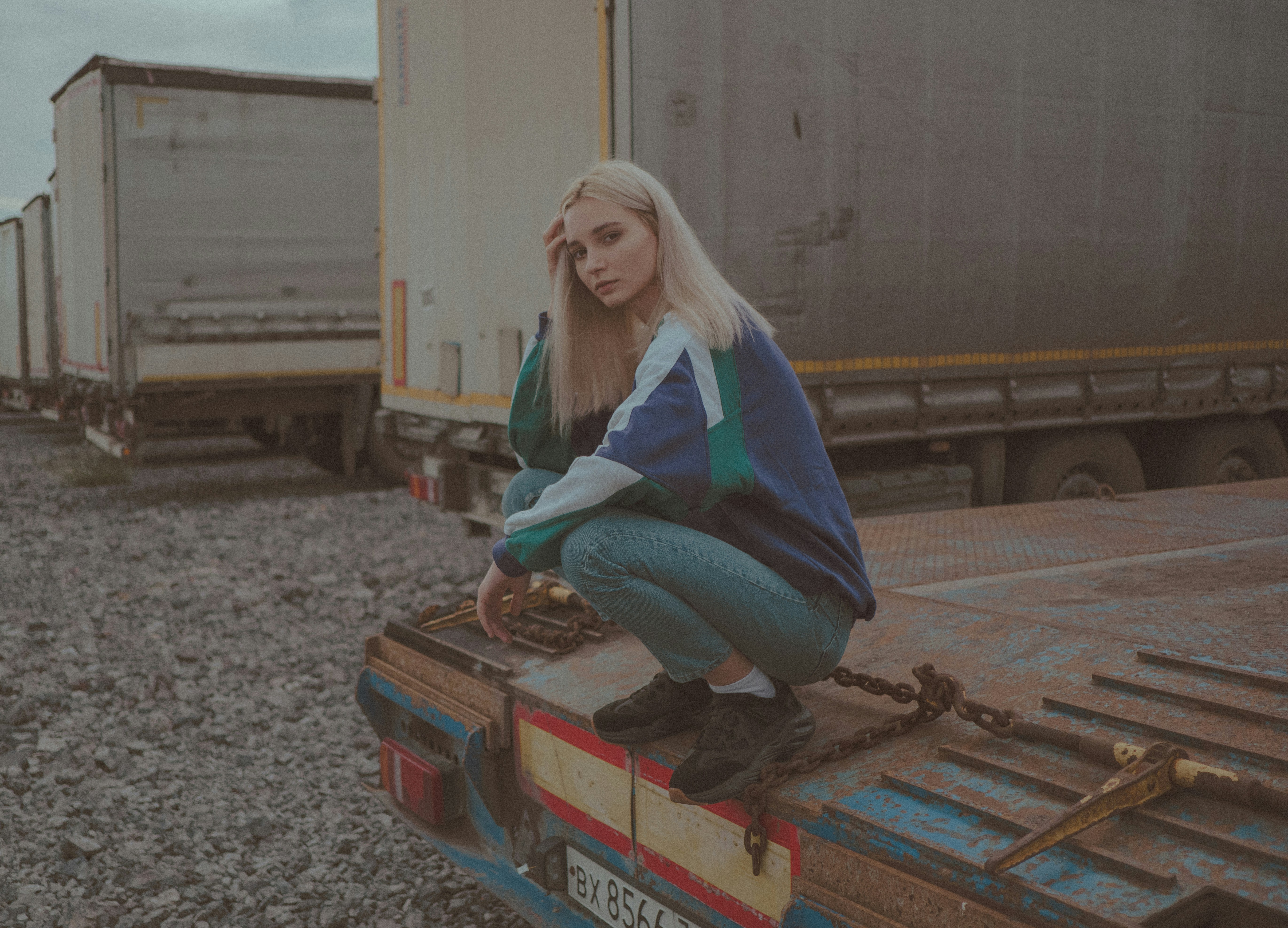 Urban Asphalt Inquiry: A Quiet Moment on the Back of a Truck Bed