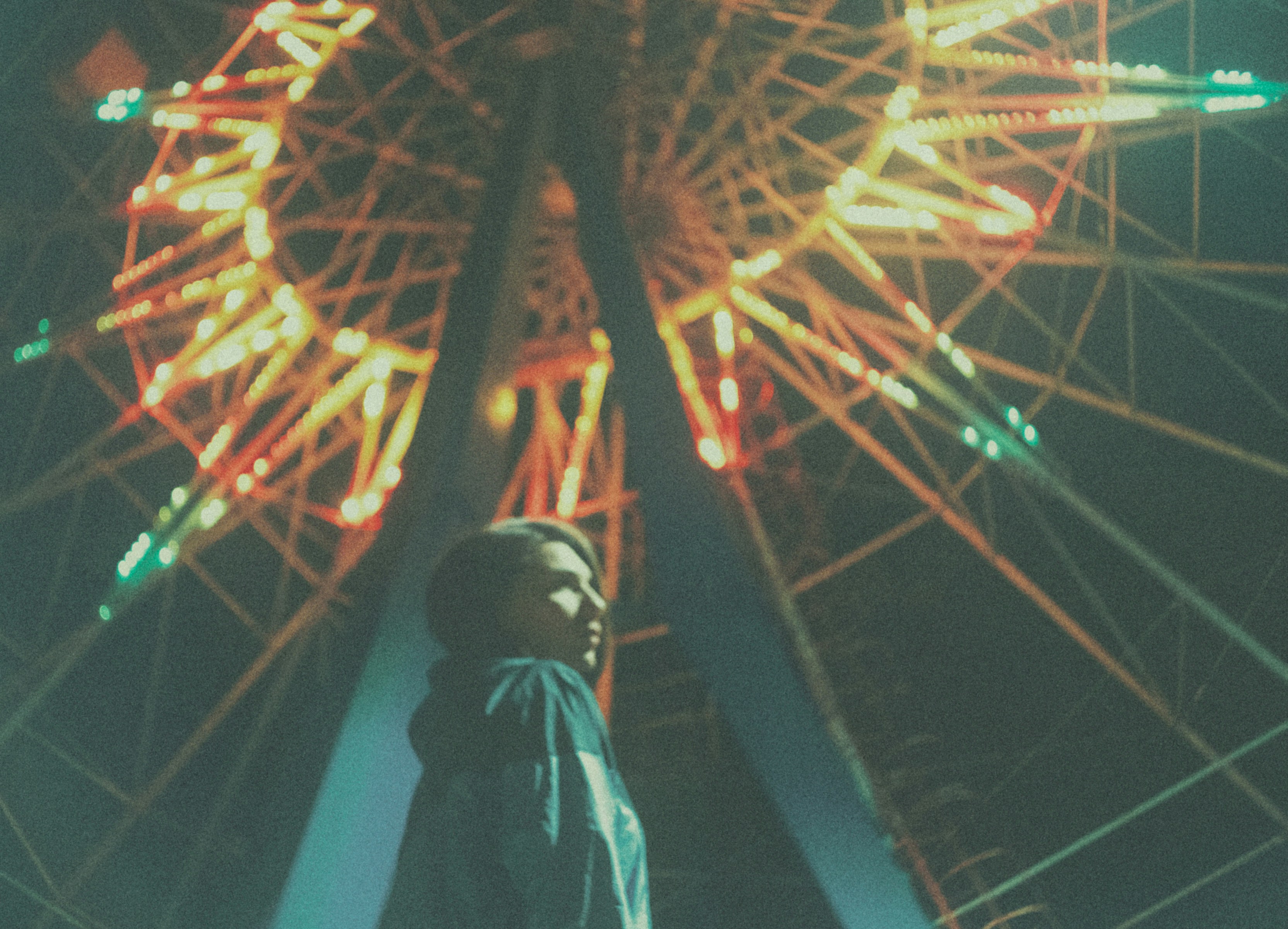 Night Lights Over a Stranger at the Carnival