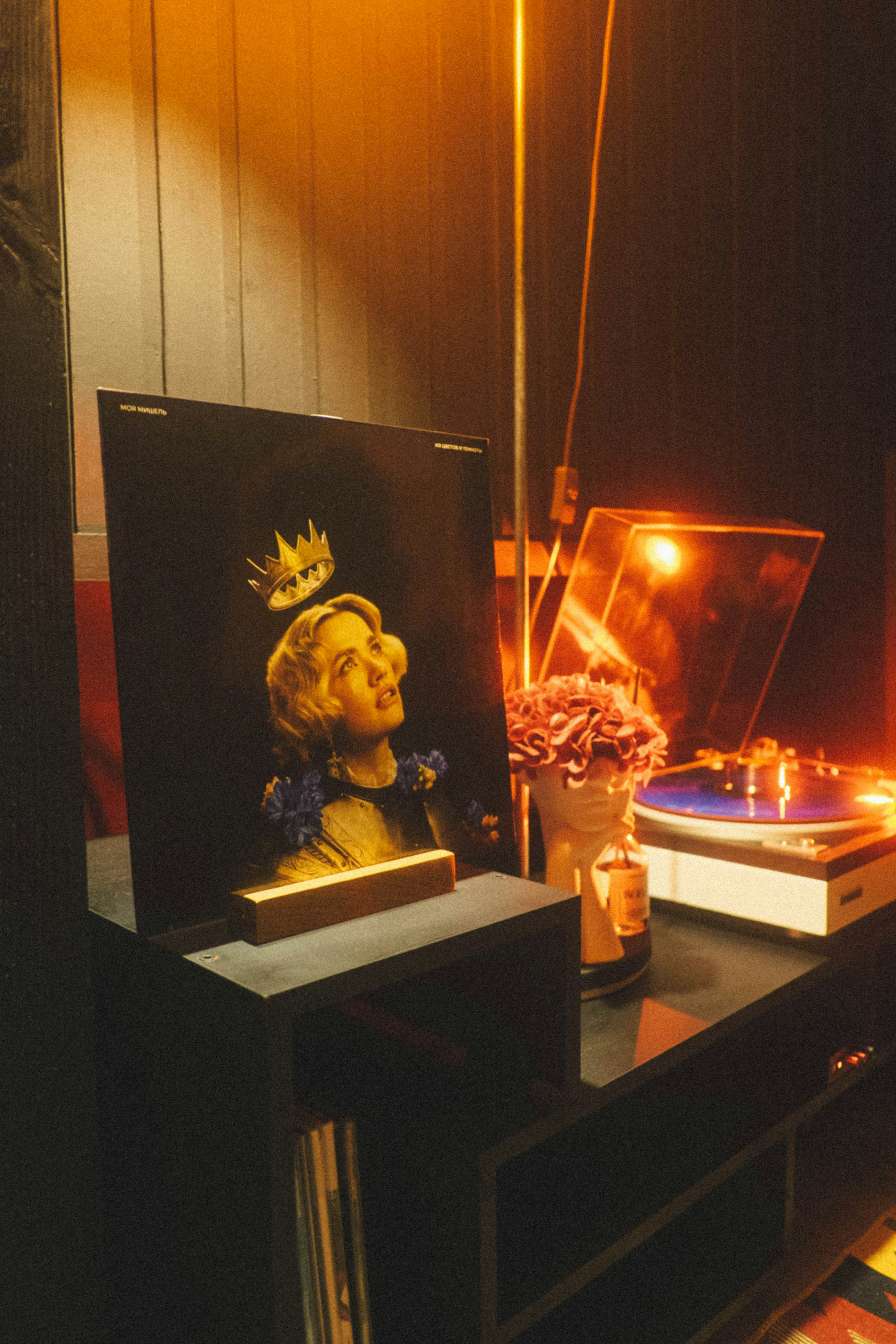 Crowned Portrait by the Turntable: A Quiet Album Corner