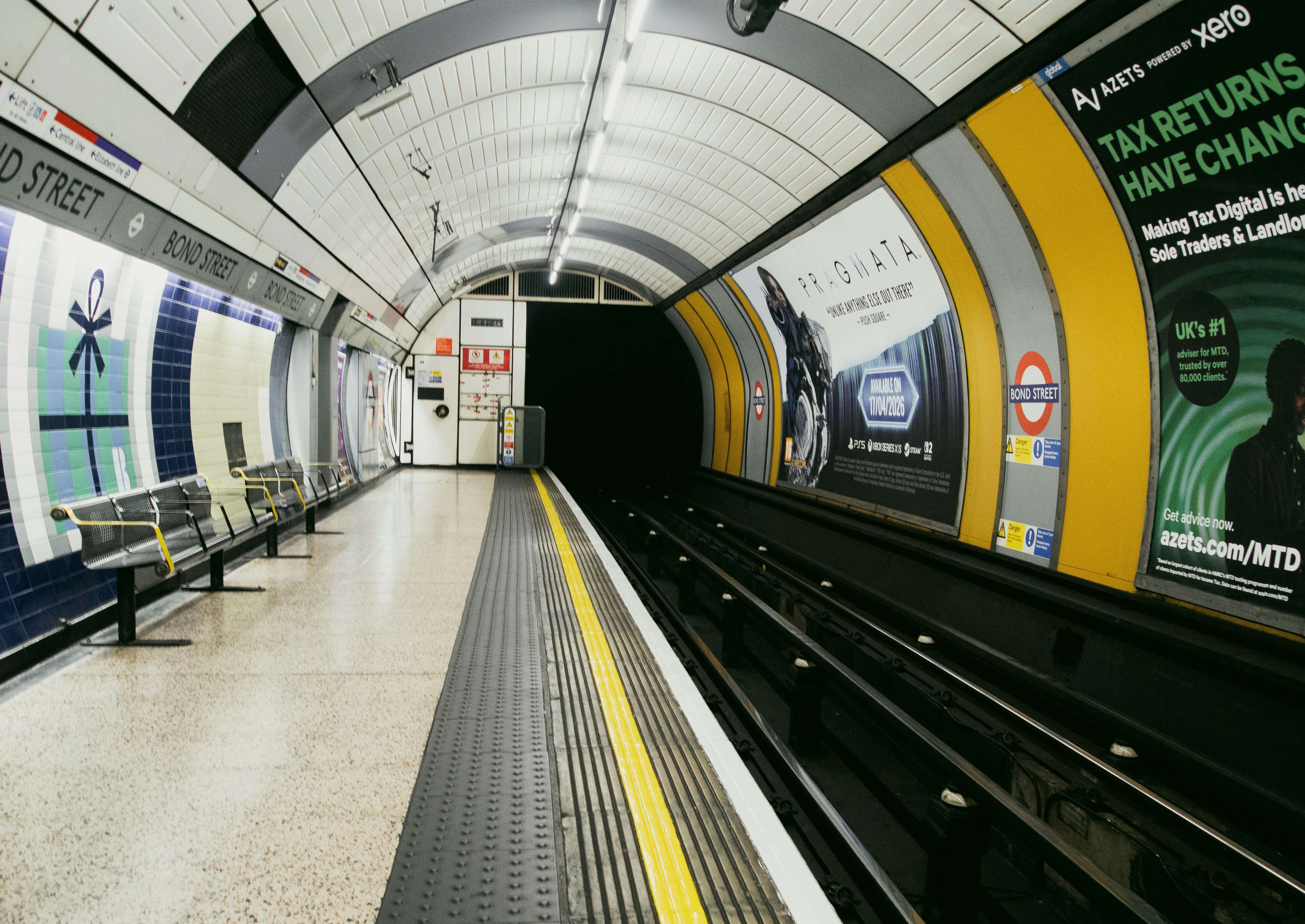 Underground Echoes: Empty Platform Reaches into Darkness