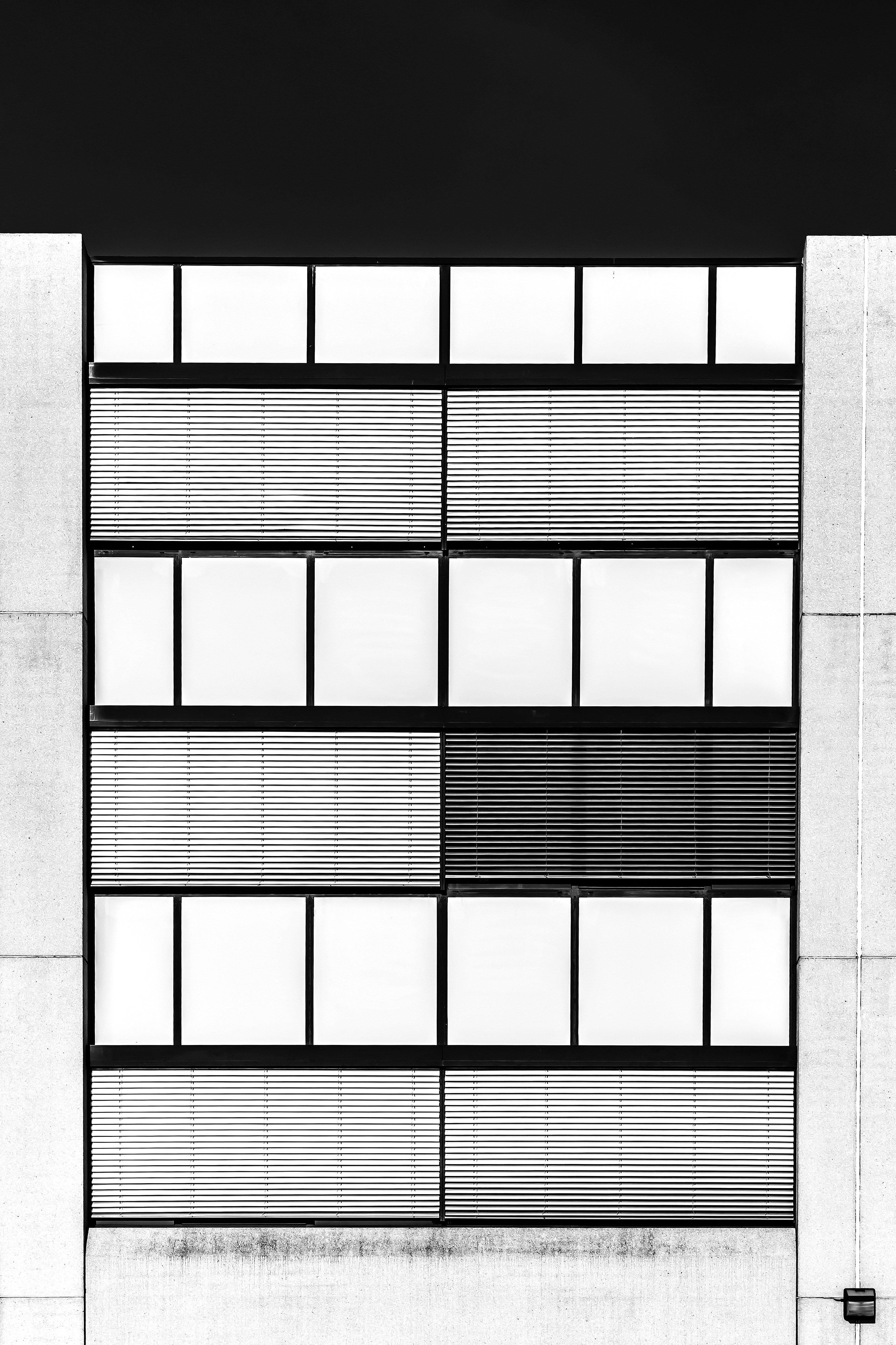 Industrial Facade in Monochrome Grid