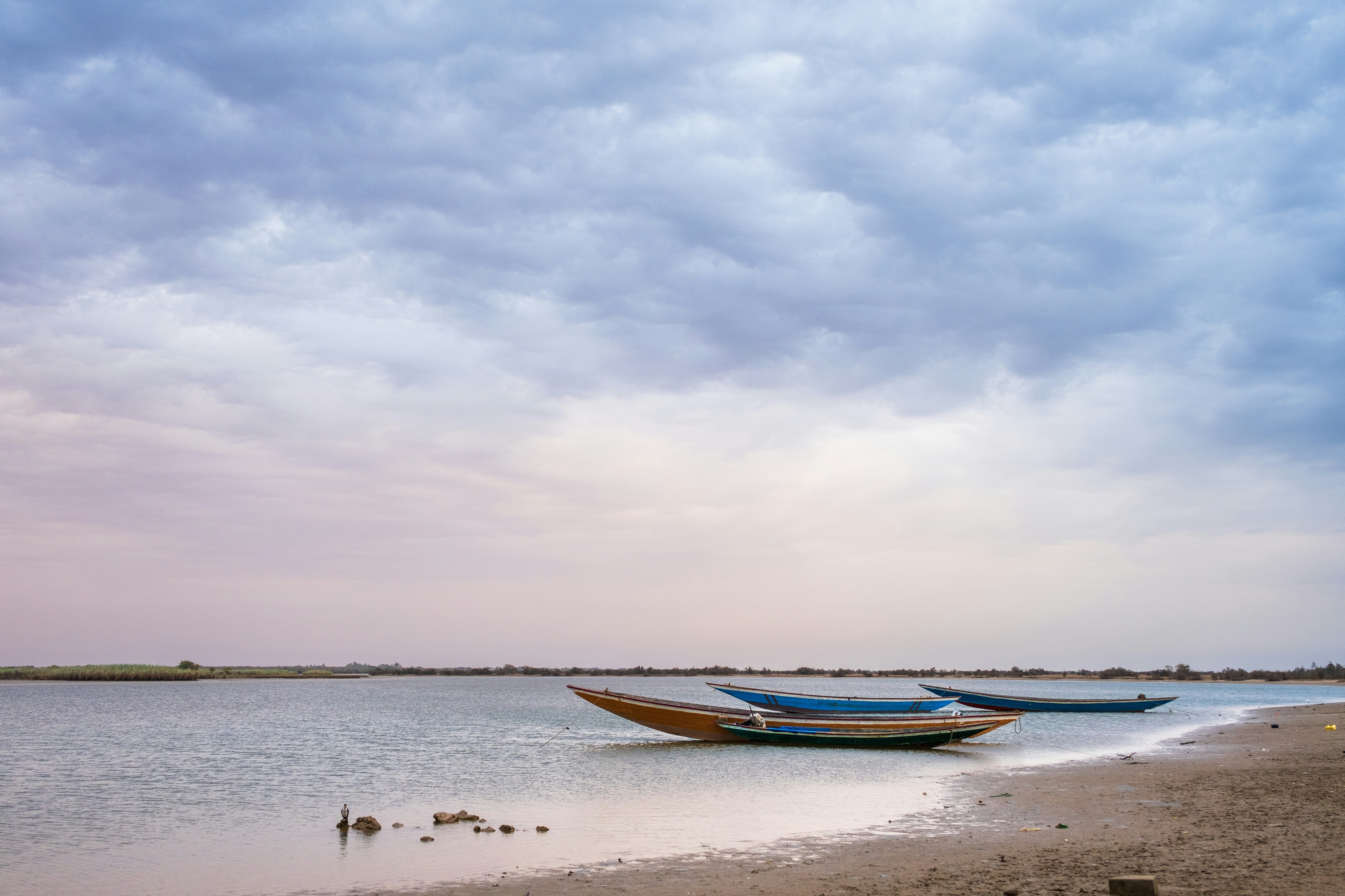 Calm Boats at Dusk on a Secluded Shore