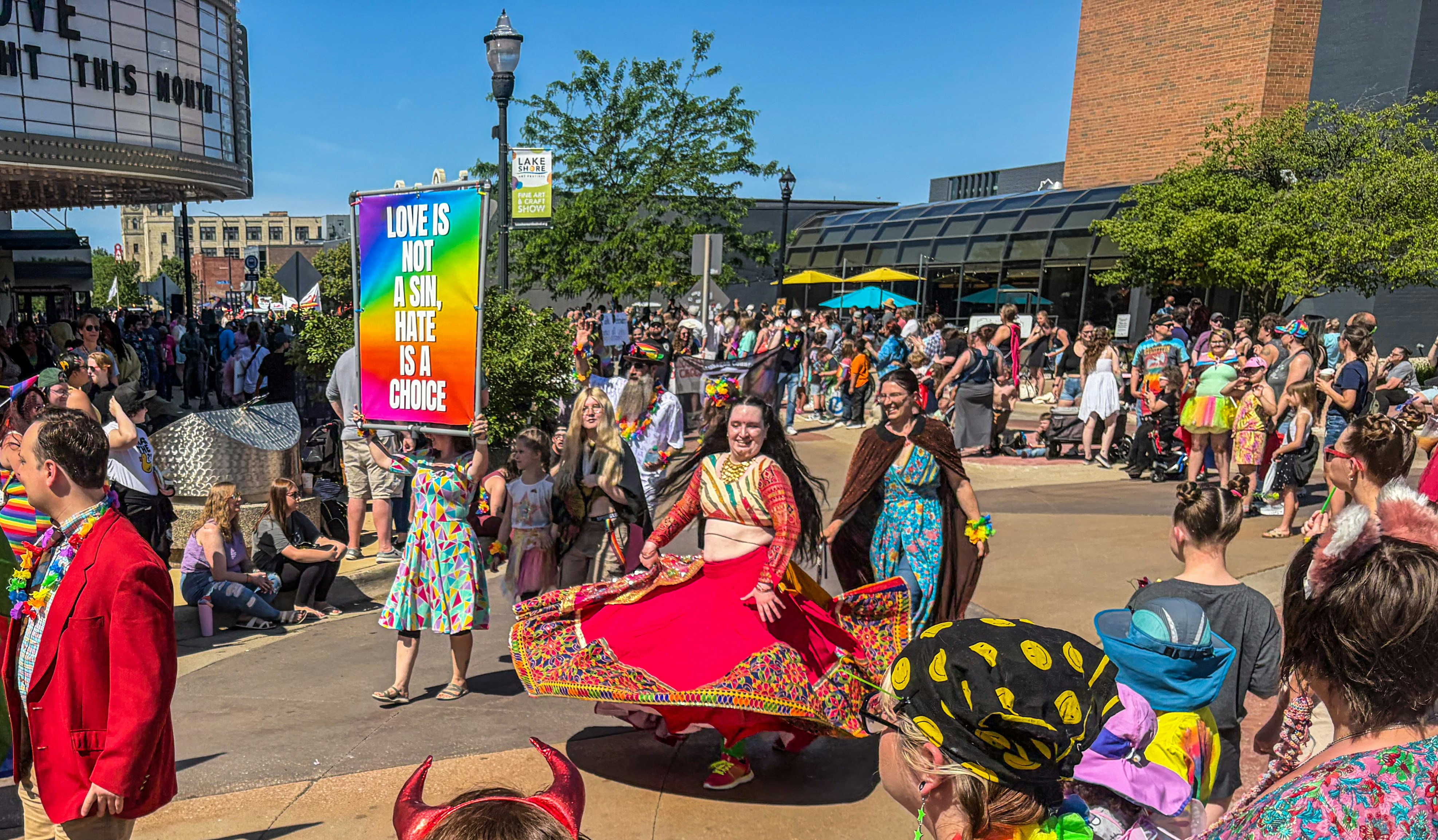 Dance in Color: A Spirited Circle Under Bright Festival Sun