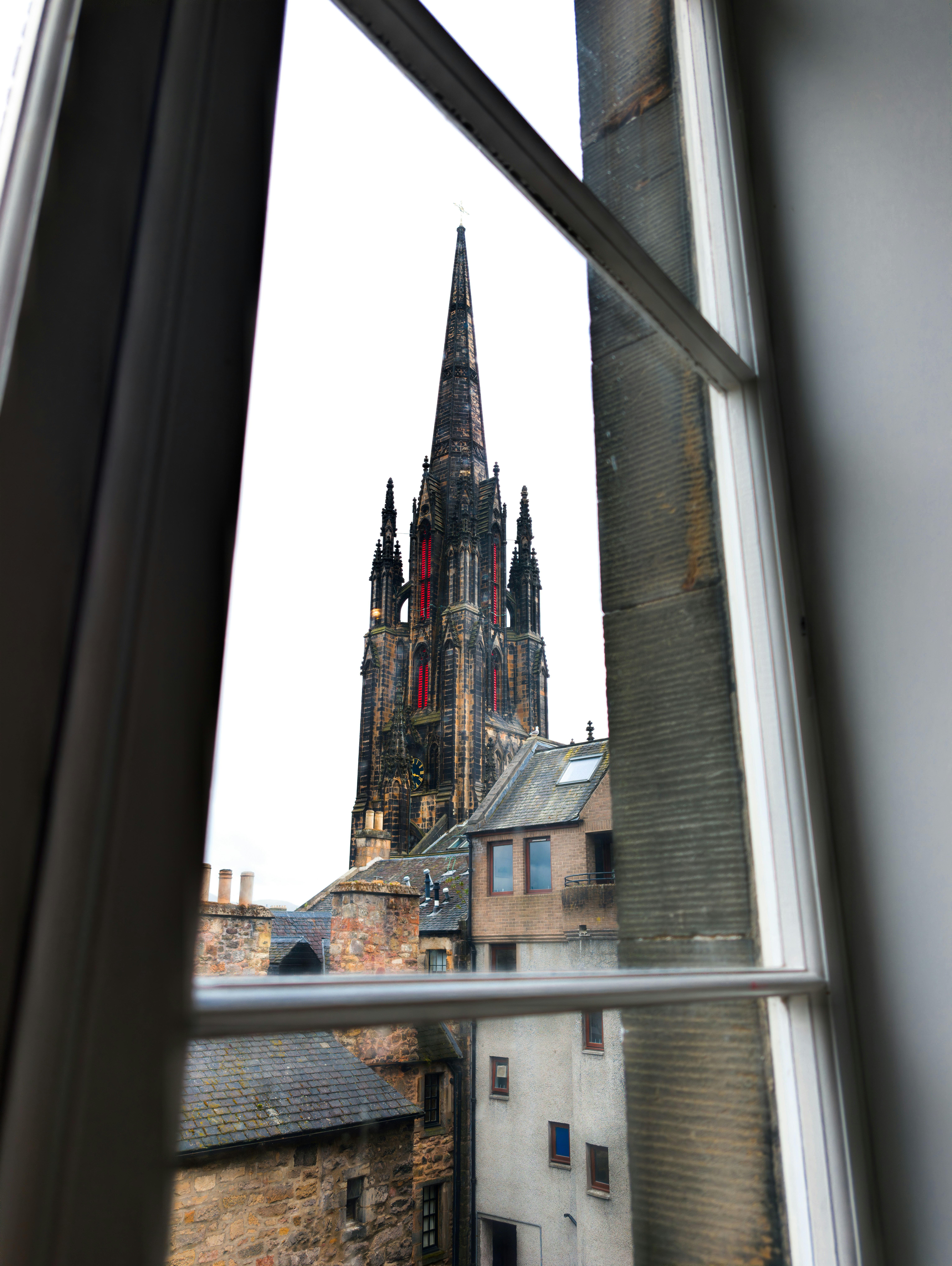 Gothic Spire From a Narrow Window
