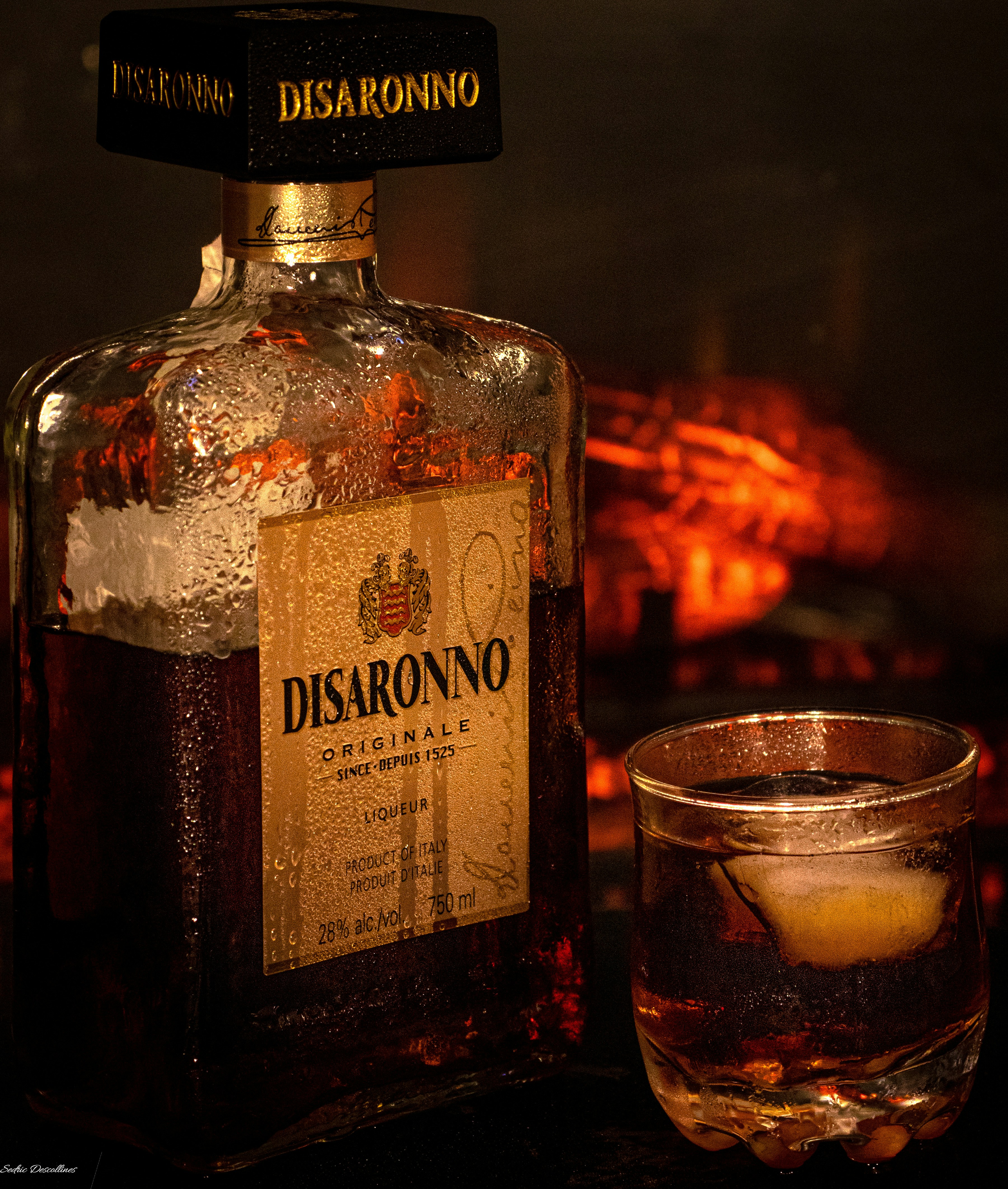 Sticky amber glow: Disaronno bottle with a frost-kissed glass